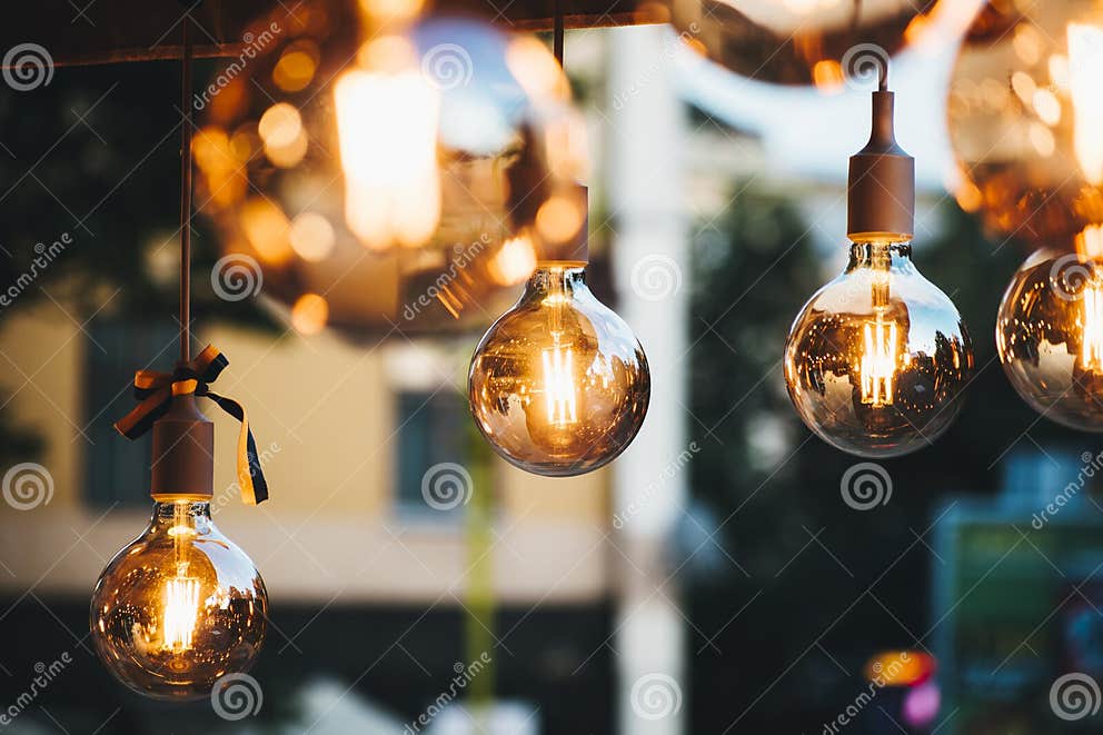 Stylish Light Bulbs in the Cafe Stock Image - Image of lamp ...