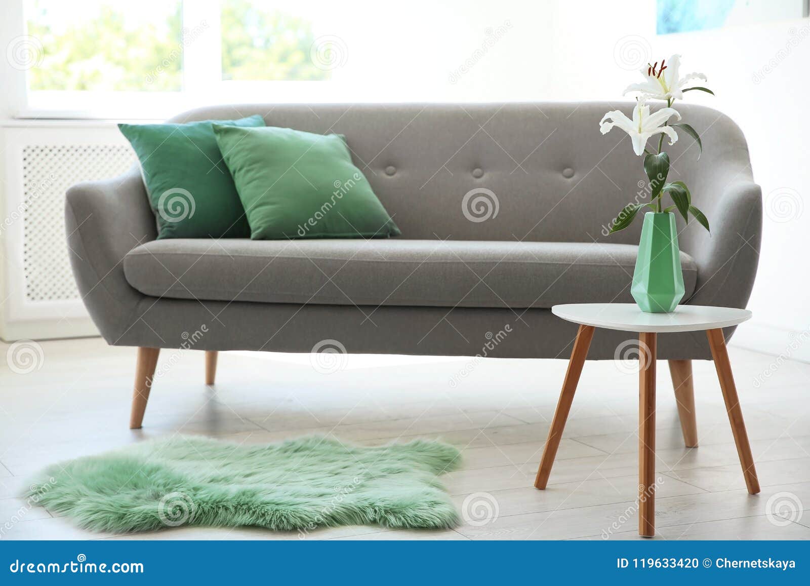Stylish Living Room Interior with Sofa and Mint Decor Stock Photo ...