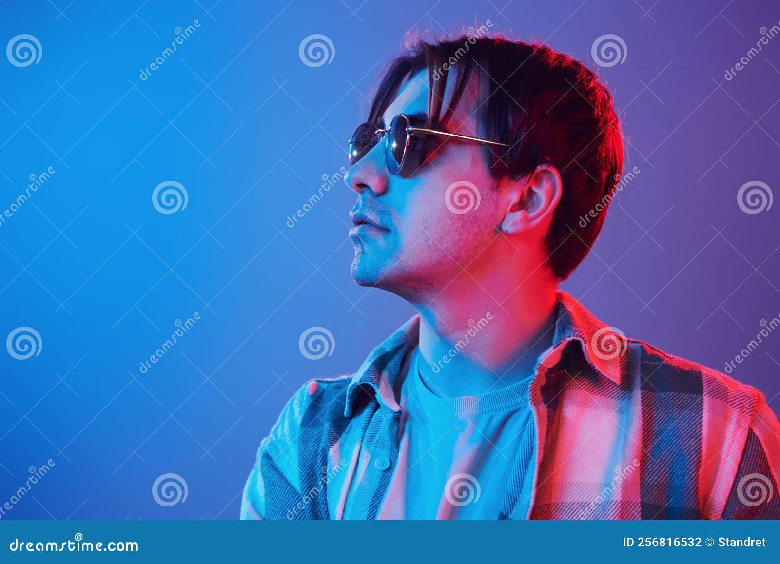Stylish Look. Man Standing in the Studio with Neon Light Stock Photo ...