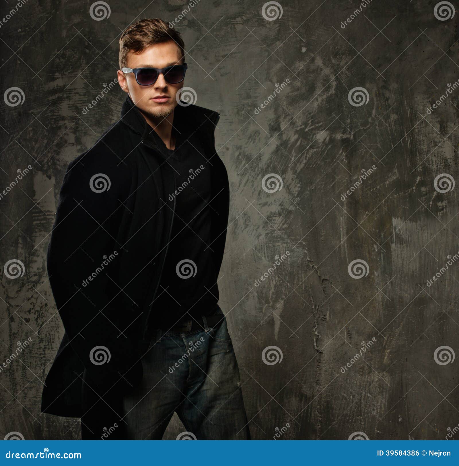 Stylish man in black coat stock photo. Image of handsome - 39584386