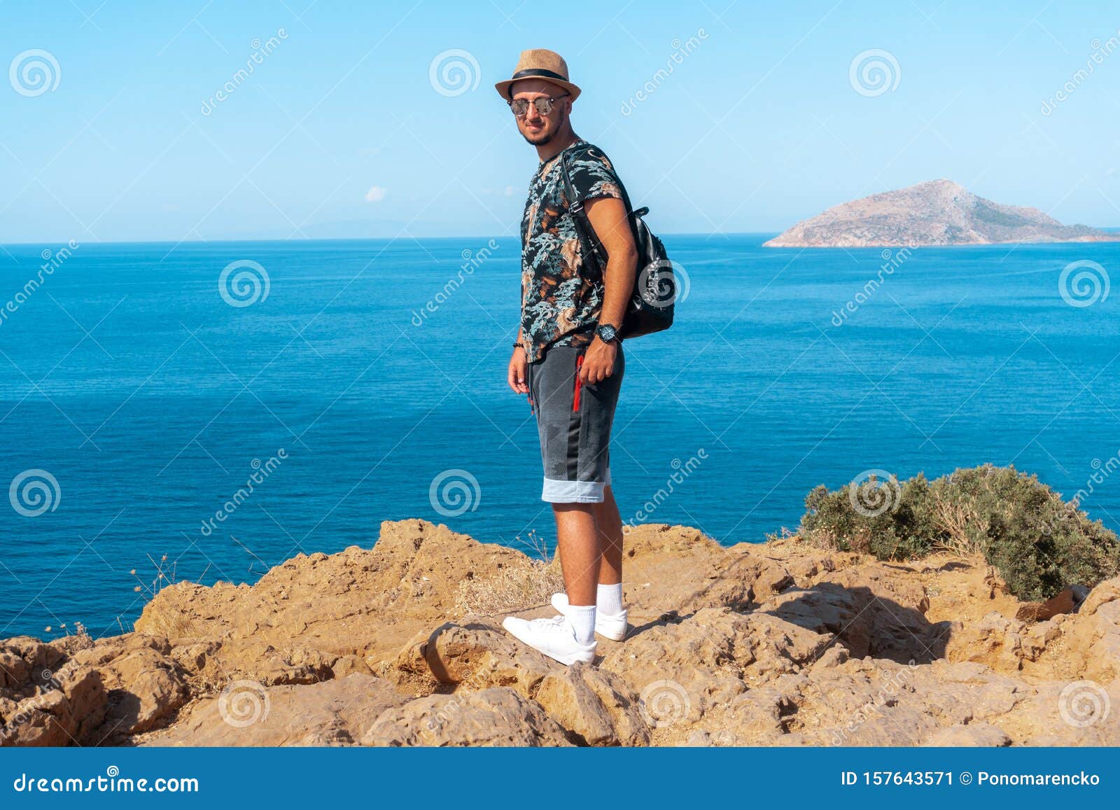 Stylish Man on the Cliff by the Sea Stock Image - Image of mountain ...