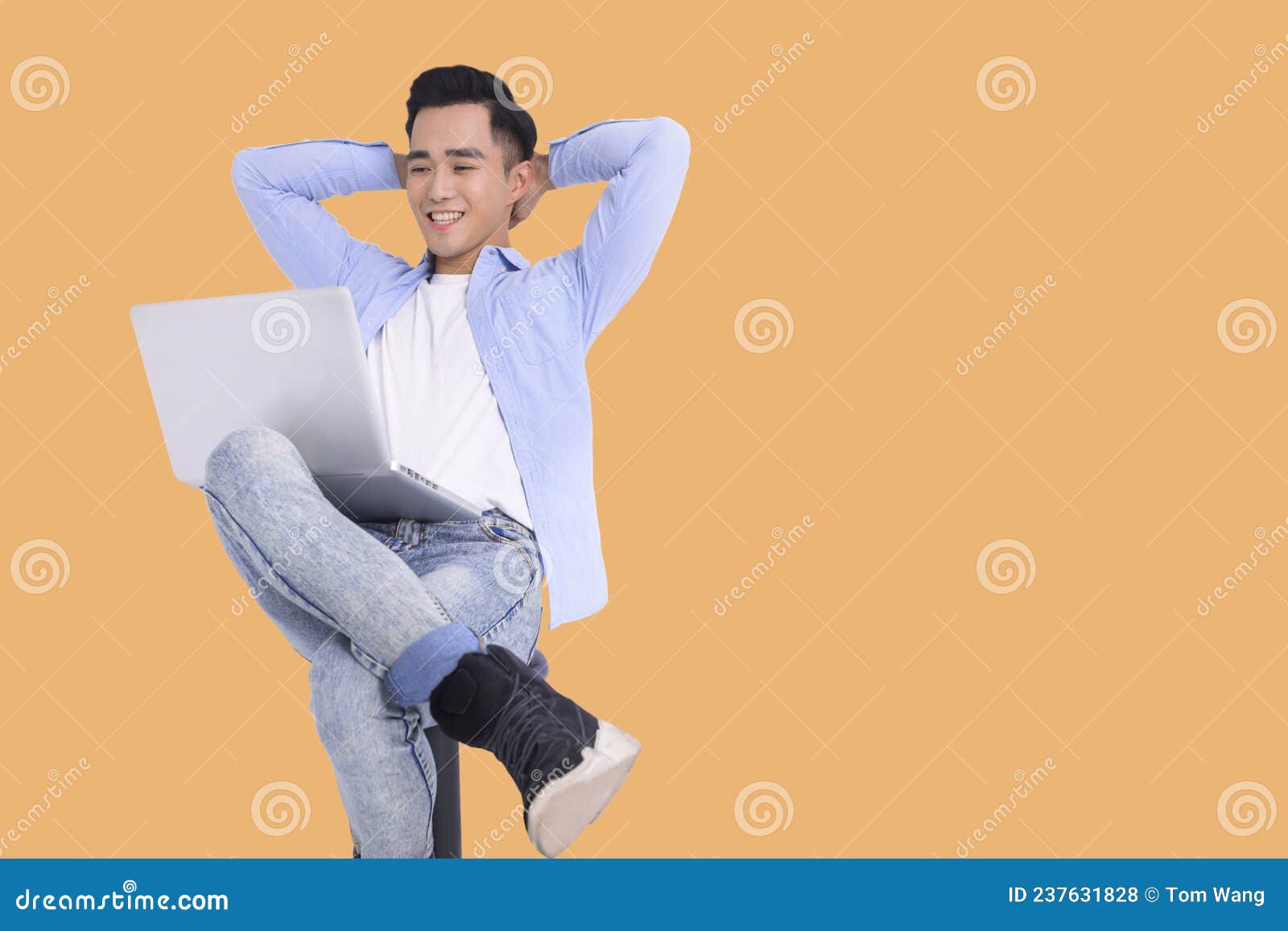 Stylish Man Dressed Casual and Working with Laptop Stock Photo - Image ...