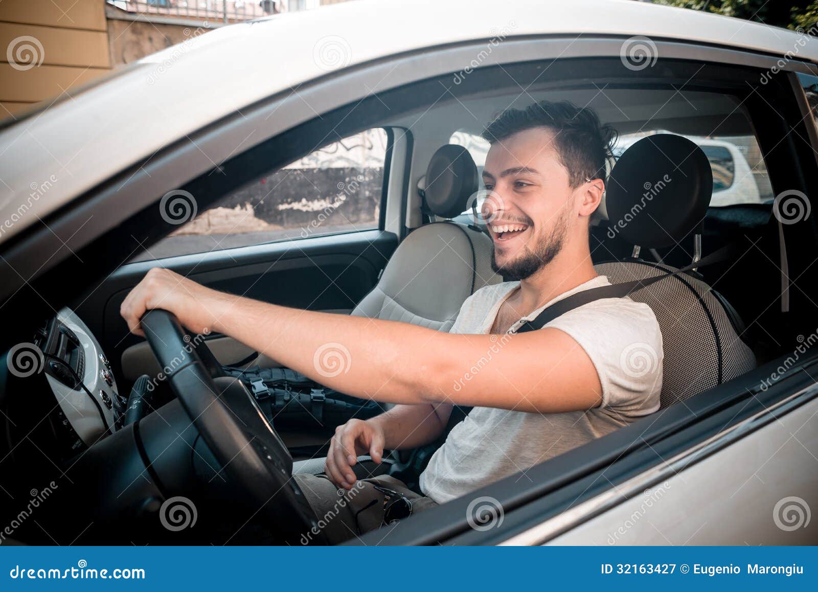 Stylish man driving car stock image. Image of natural - 32163427