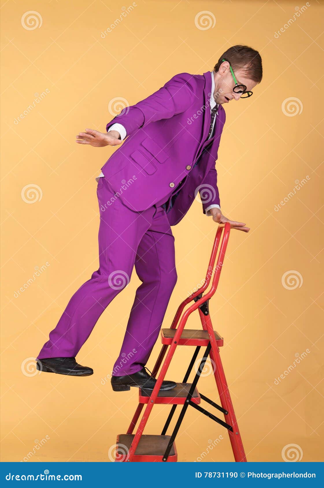 Stylish Man Falling Off a Ladder Stock Photo - Image of ladder, risk ...