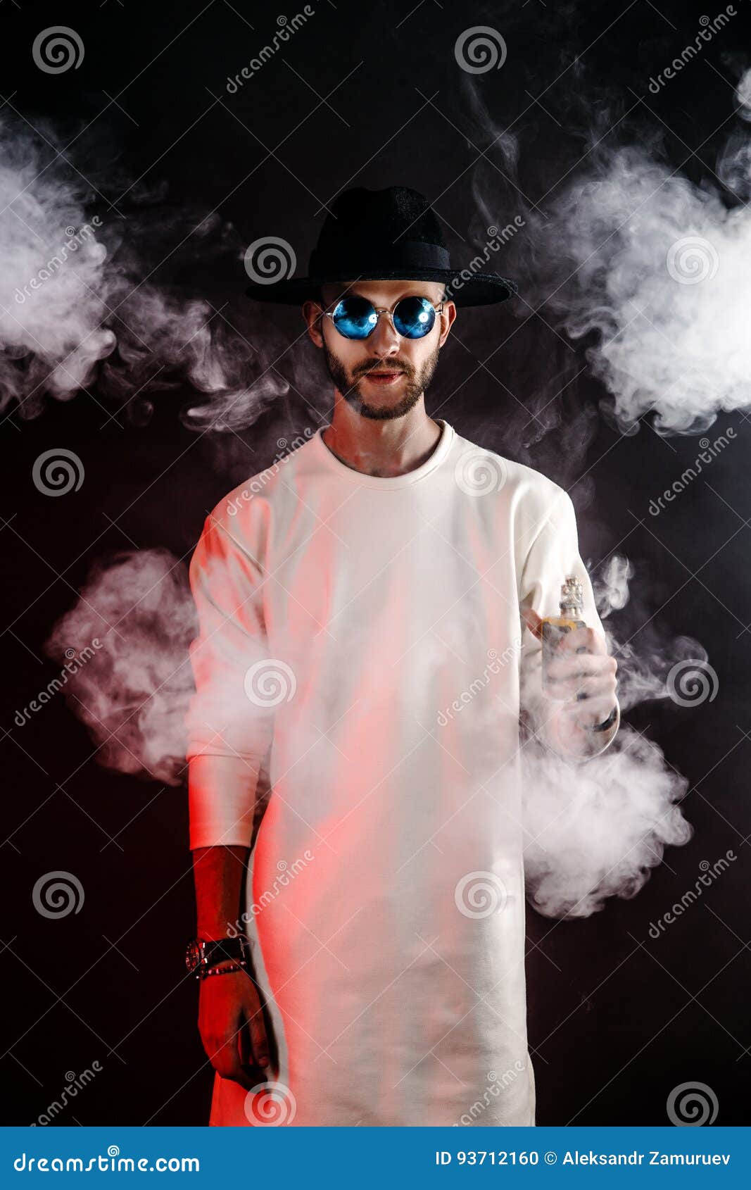 Stylish man in hat vaping stock photo. Image of inhale - 93712160