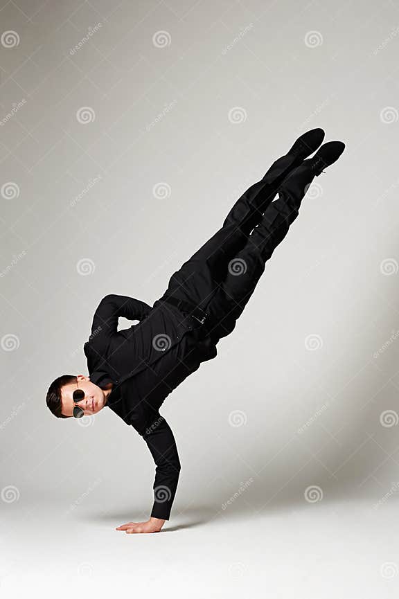 Stylish Man Standing on One Hand Stock Photo - Image of cool, style ...