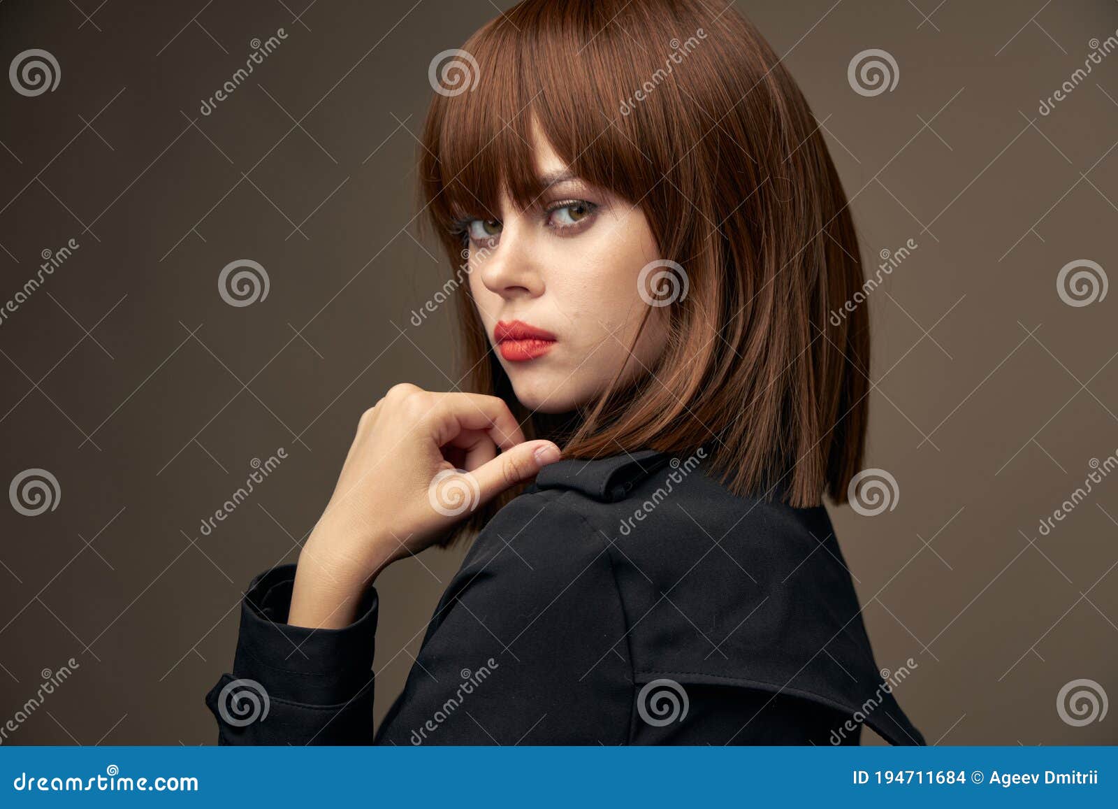 Model in Jacket Pose for the Camera Beige Background Stock Photo ...