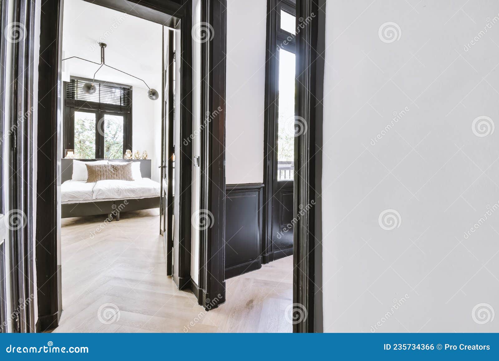 White Corridor with Black Door Frames Stock Photo - Image of decor ...