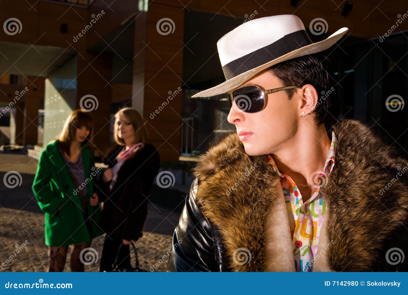Stylish Pimp And Two Young Women Stock Photo - Image: 7142980
