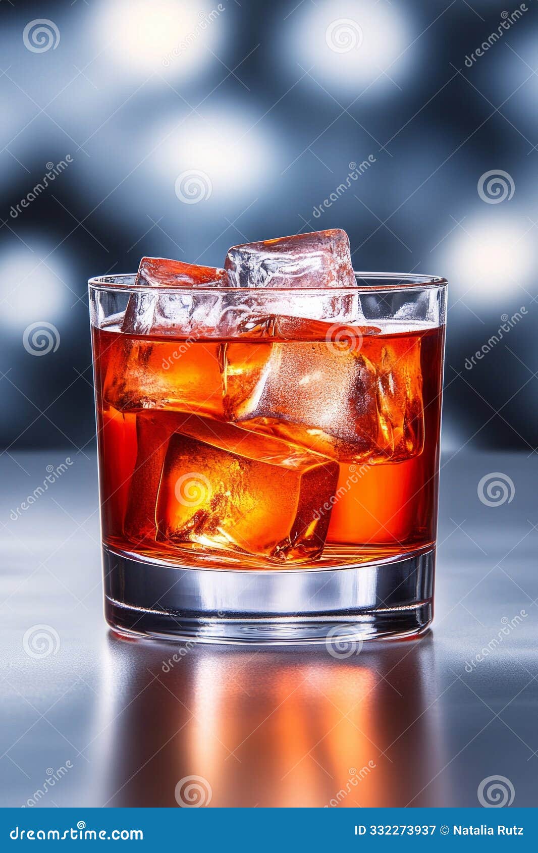 A Stylish Red Cocktail with Large Ice Cubes in a Glass, Captured with ...