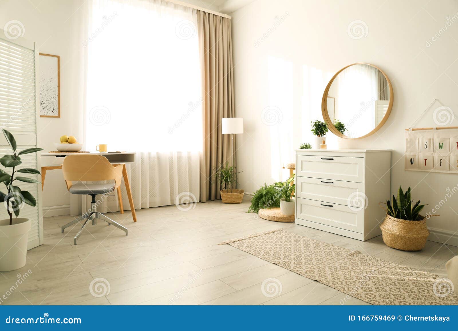 Stylish Room Interior with Chest of Drawers and Mirror Stock Image ...