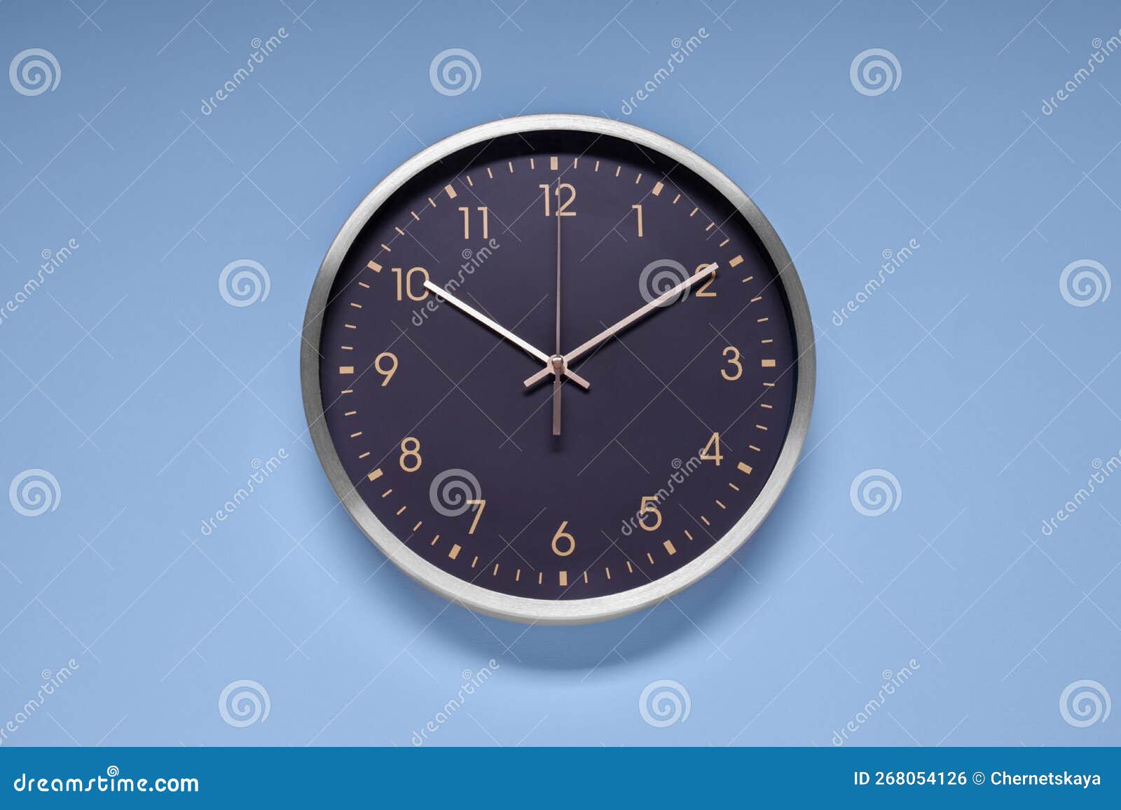 Stylish Round Clock on Light Blue Background, Top View. Interior ...