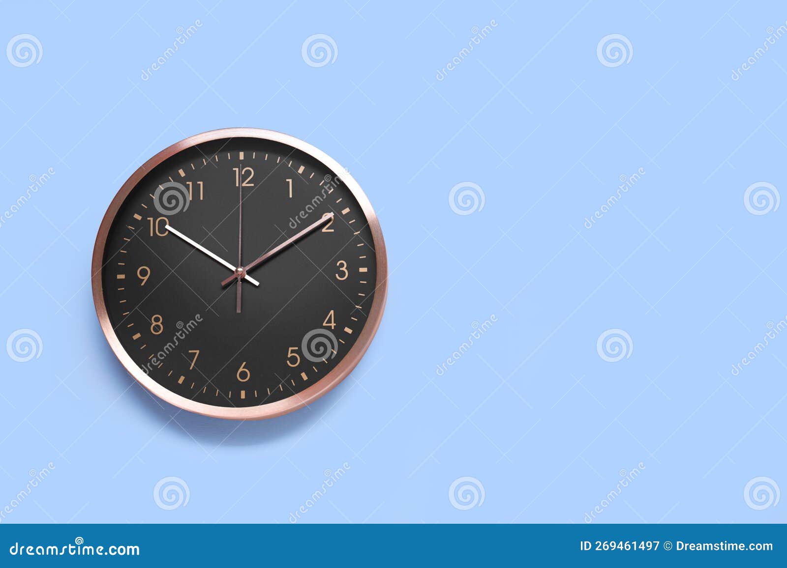 Stylish Round Clock on Light Blue Background, Top View with Space for ...