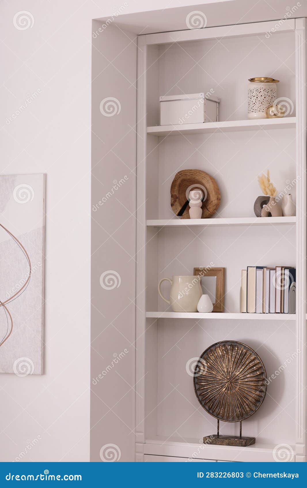 Stylish Shelves with Different Decor Elements in Room. Interior Design ...