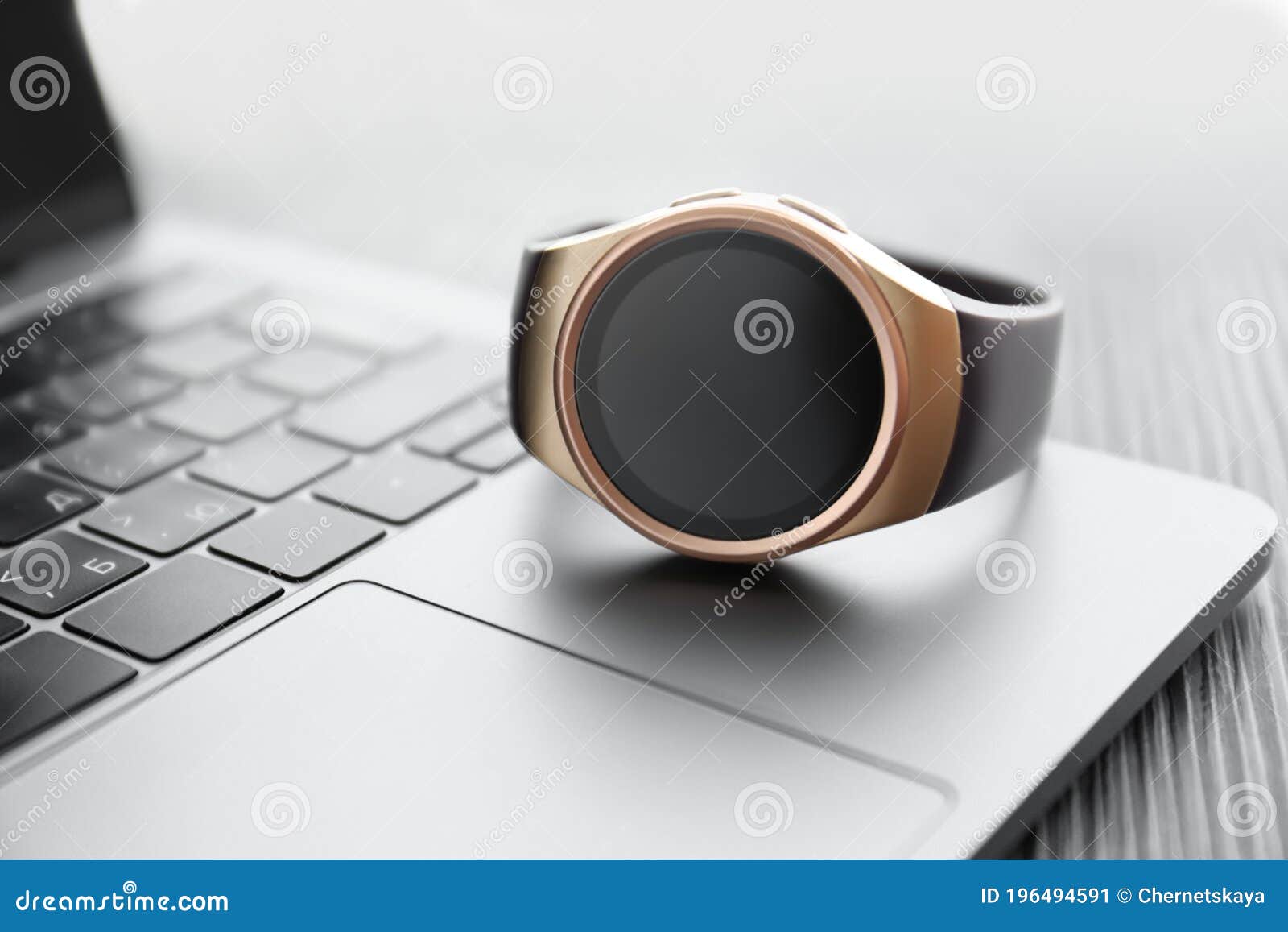 Stylish Smart Watch on Laptop, Closeup View Stock Image - Image of ...