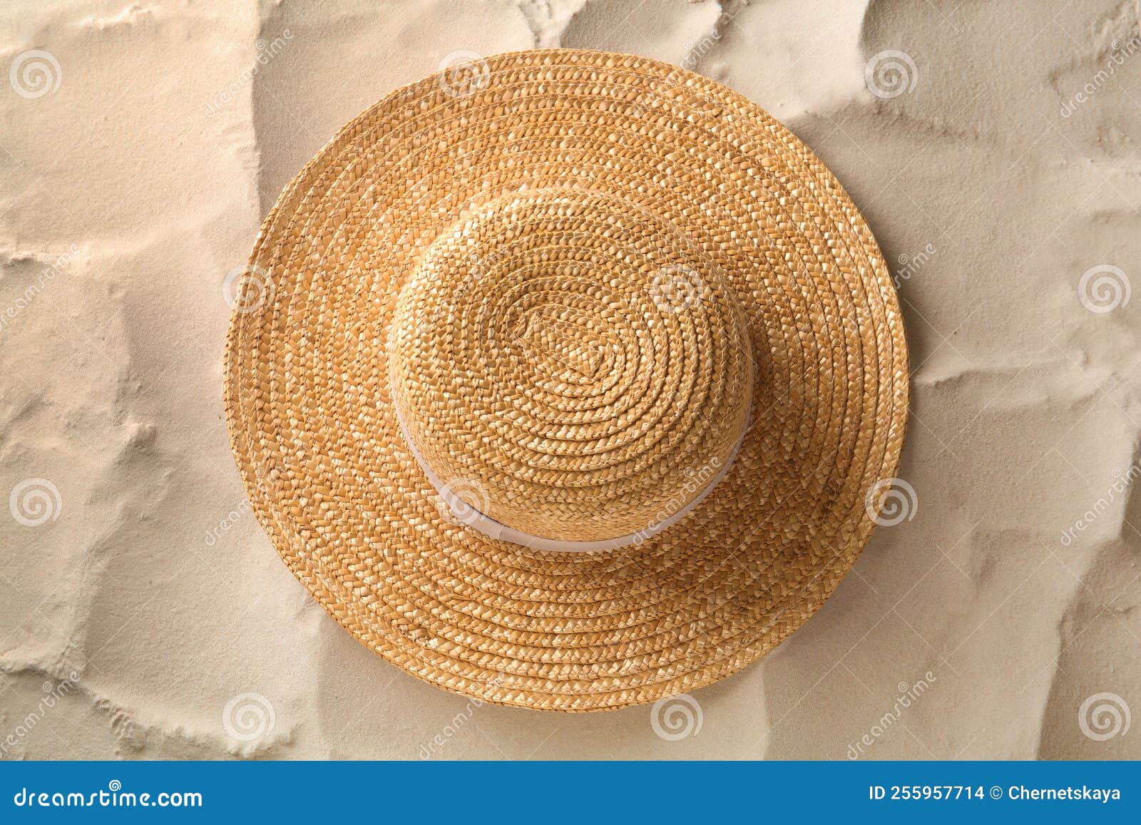 Stylish Straw Hat on Sand, Top View Stock Photo - Image of brim ...