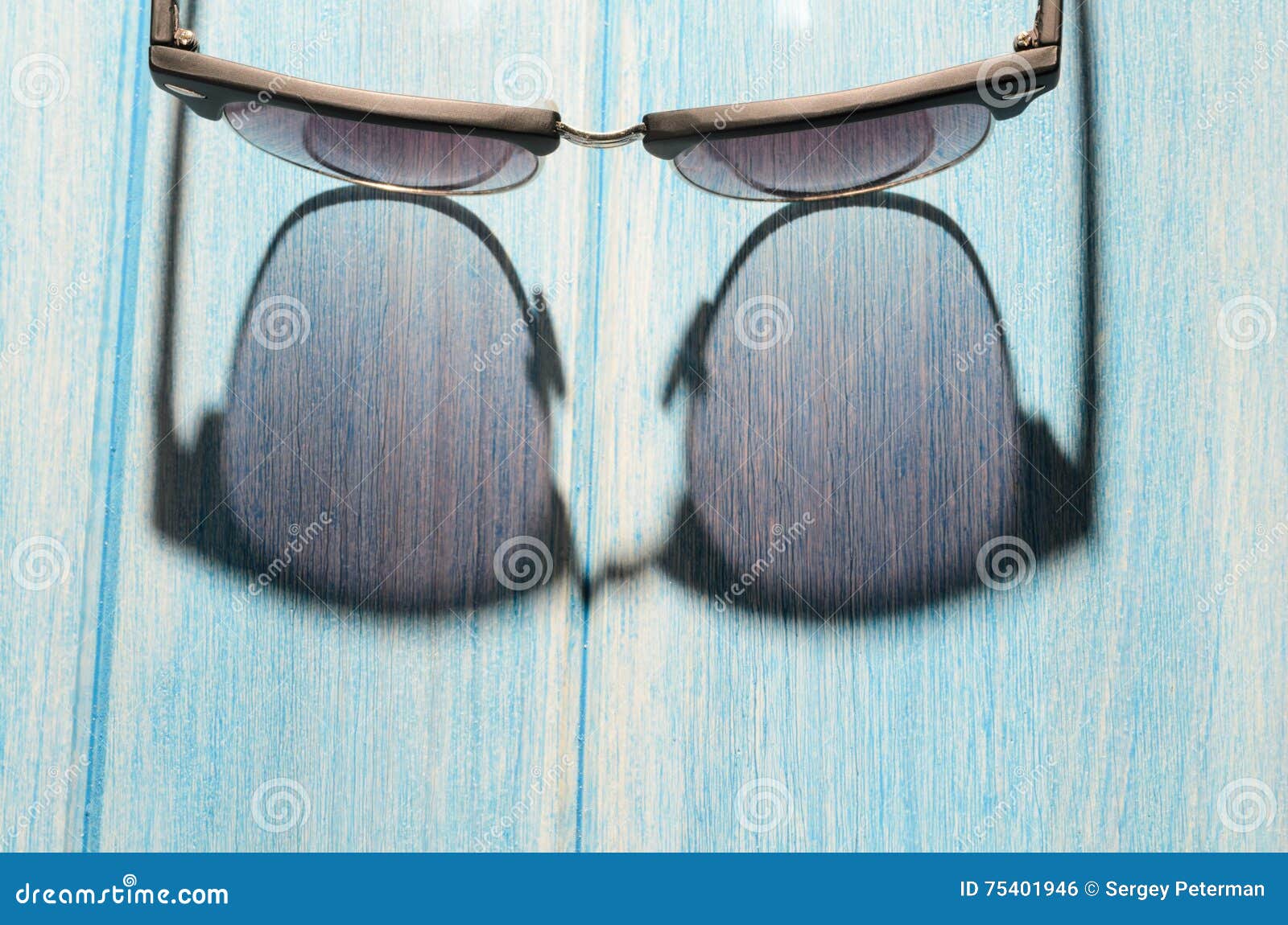Stylish Sunglasses on Table Stock Photo - Image of blue, brown: 75401946