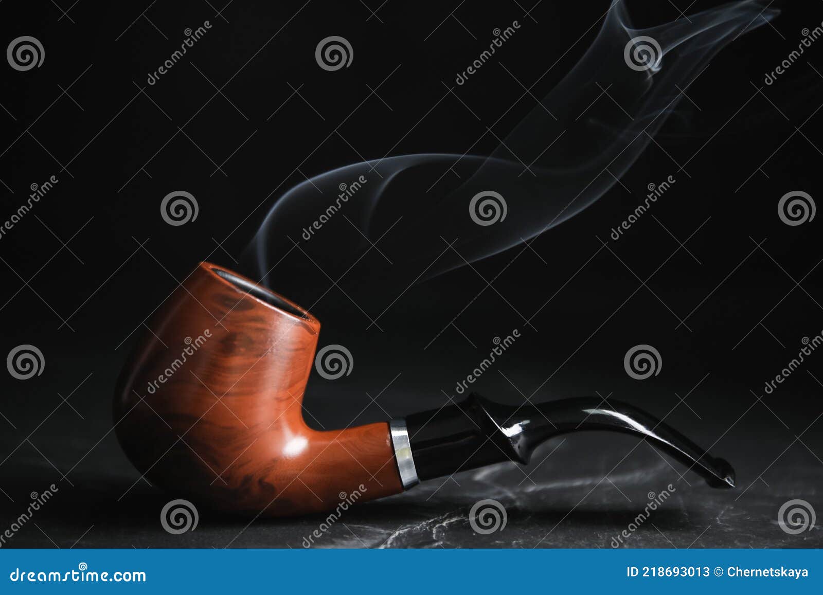 Stylish Tobacco Pipe with Smoke on Black Table Stock Image - Image of ...