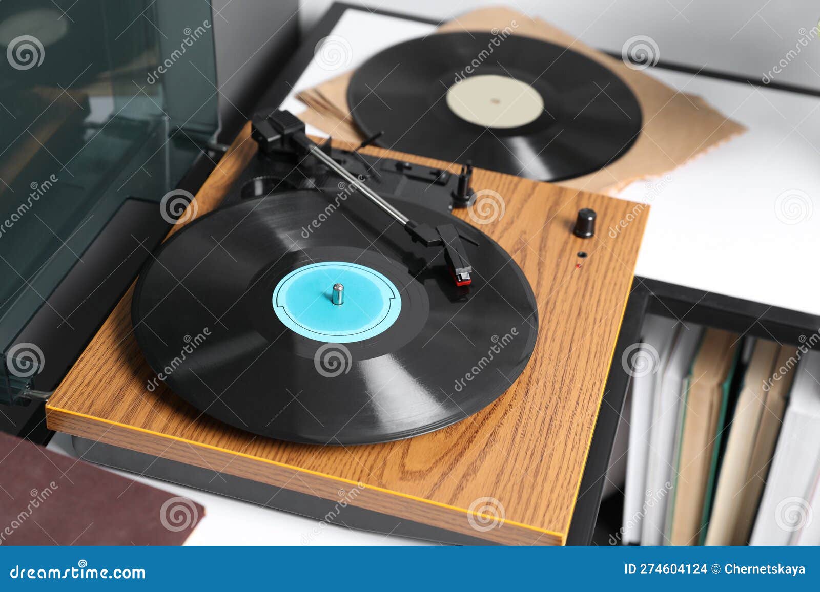 Stylish Turntable with Vinyl Disc on Table in Room, Closeup Stock Photo ...