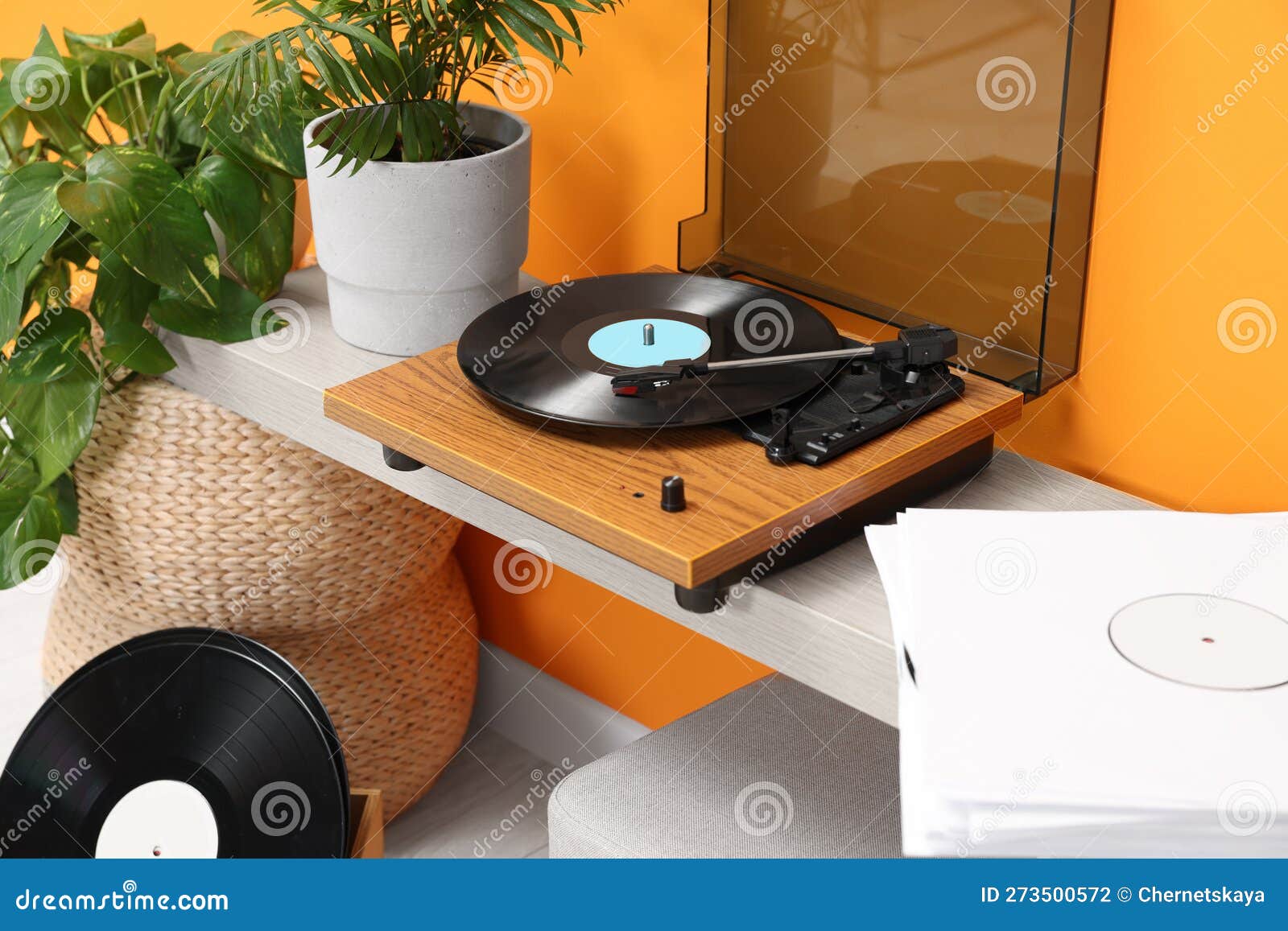 Stylish Turntable with Vinyl Record on Console Table Indoors Stock ...