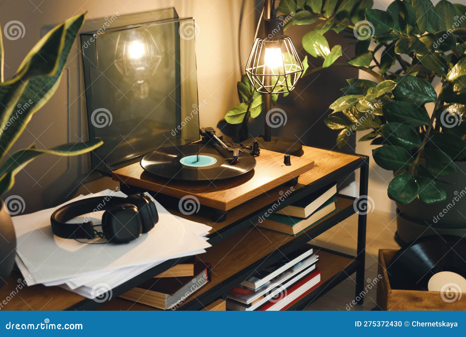 Stylish Turntable with Vinyl Record on Table in Cozy Room Stock Photo ...
