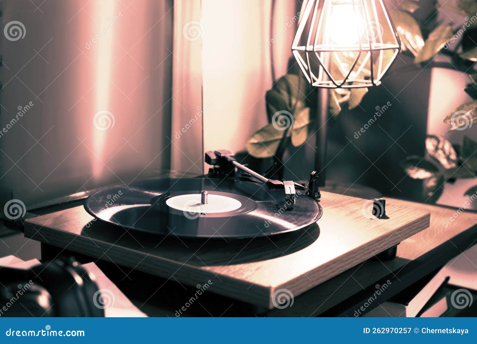 Stylish Turntable with Vinyl Record on Table Indoors. Black White ...