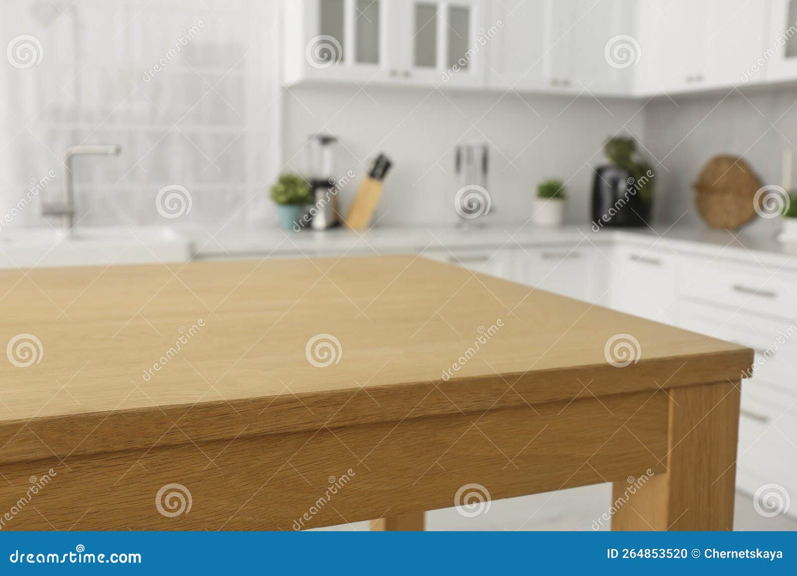 Stylish Wooden Table in Kitchen. Interior Design Stock Photo - Image of ...