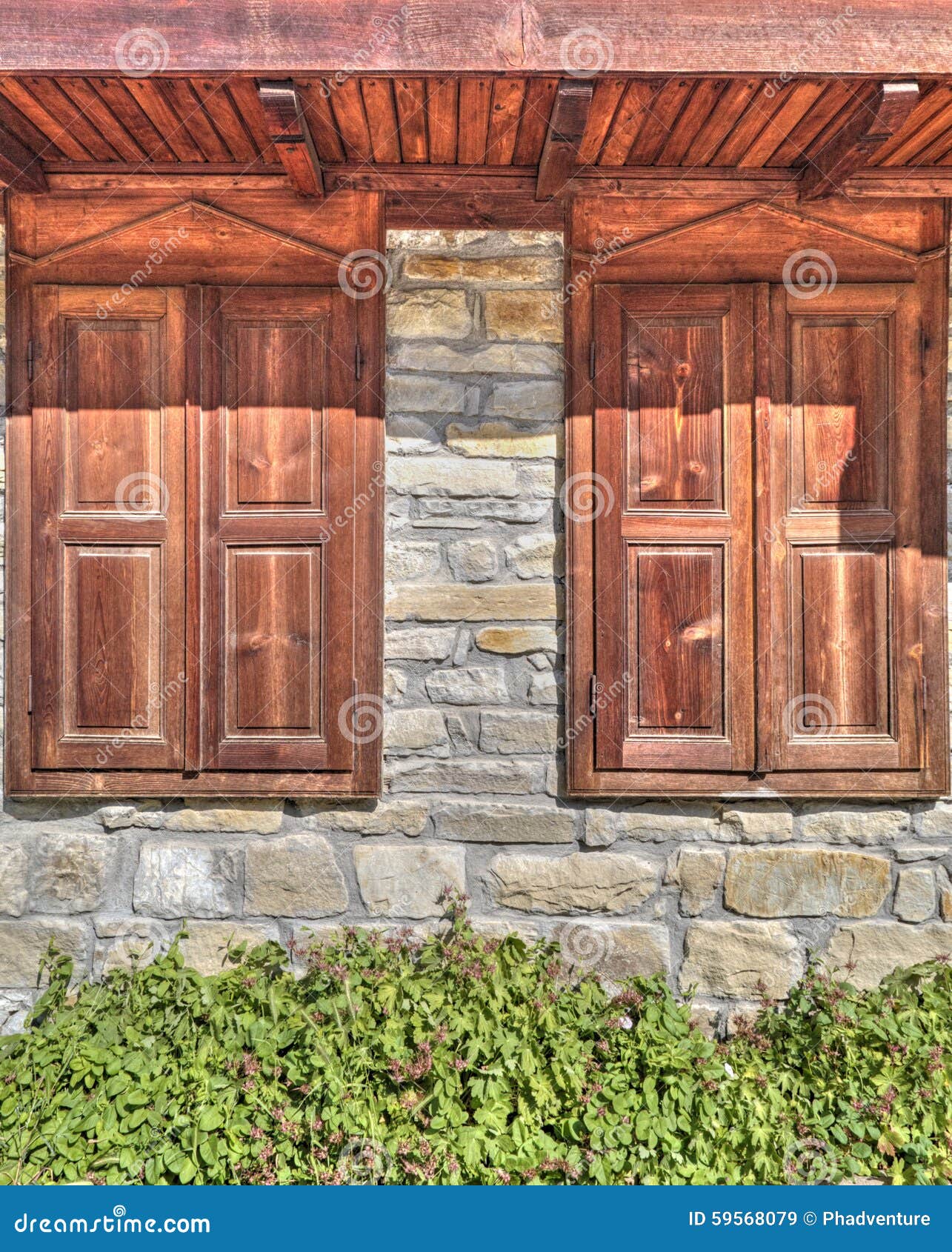 Stylish Wooden Windows on Stone Wall Stock Image - Image of ...
