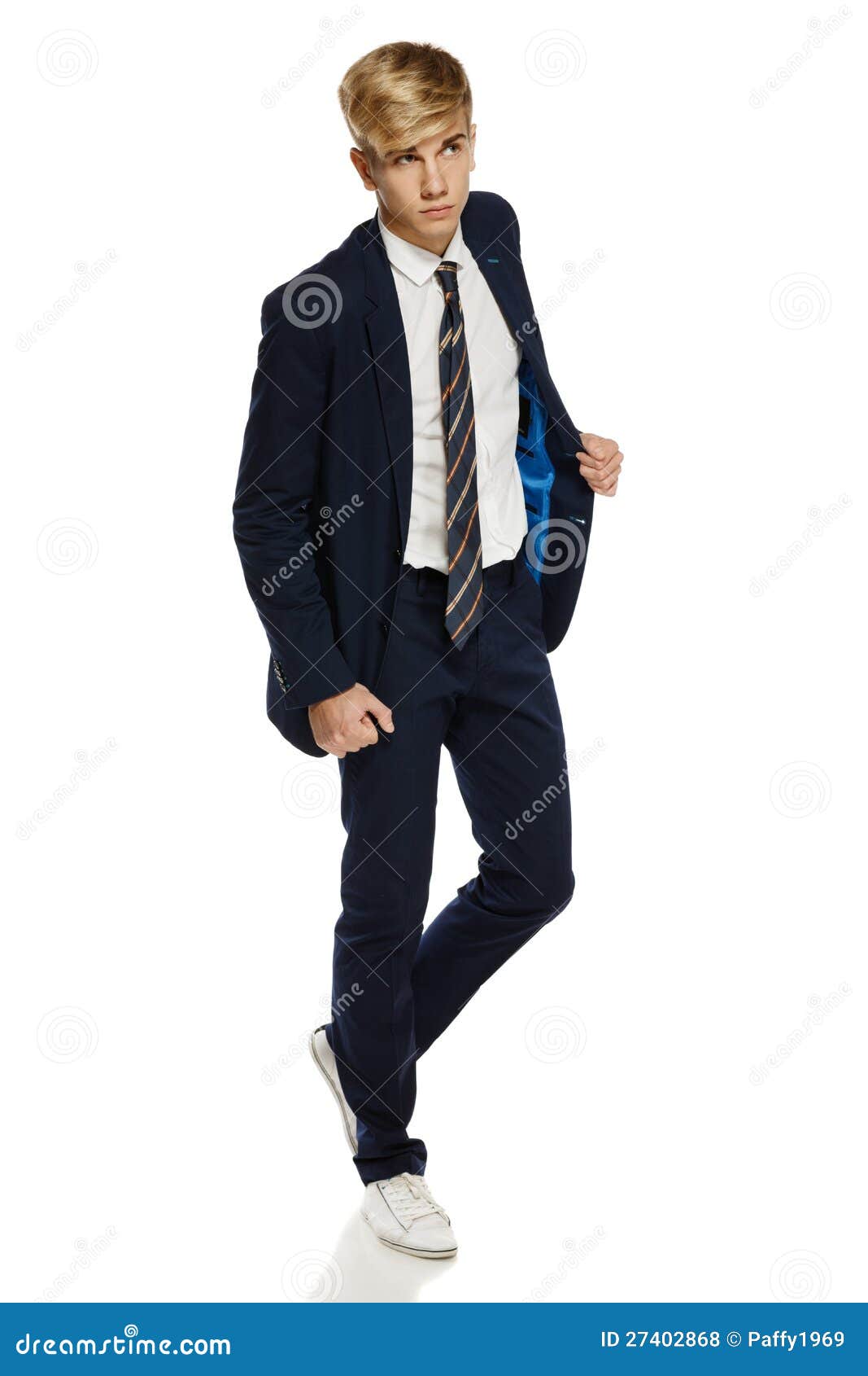 Stylish Young Man in Suit Walking Stock Photo - Image of background ...