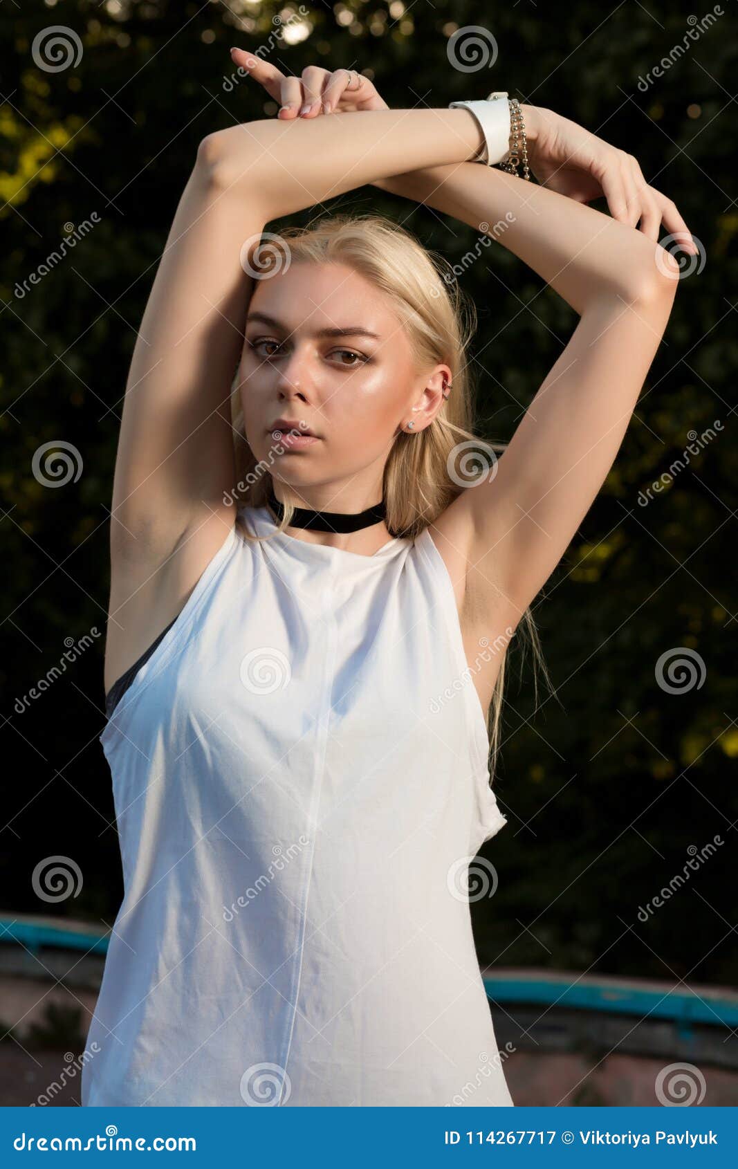 Stylish Blonde Girl With Long Hair Dressed In Fashionable Clothe Stock