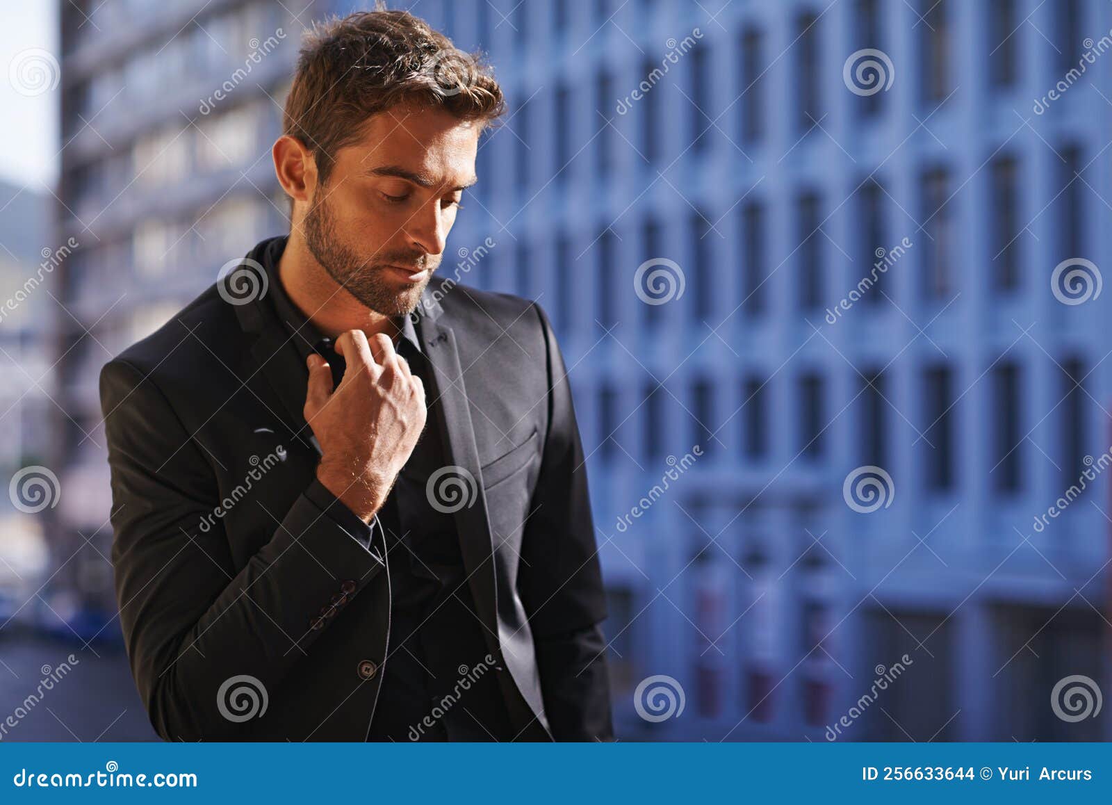 Stylishly Confident. a Handsome and Confident Young Man. Stock Photo ...