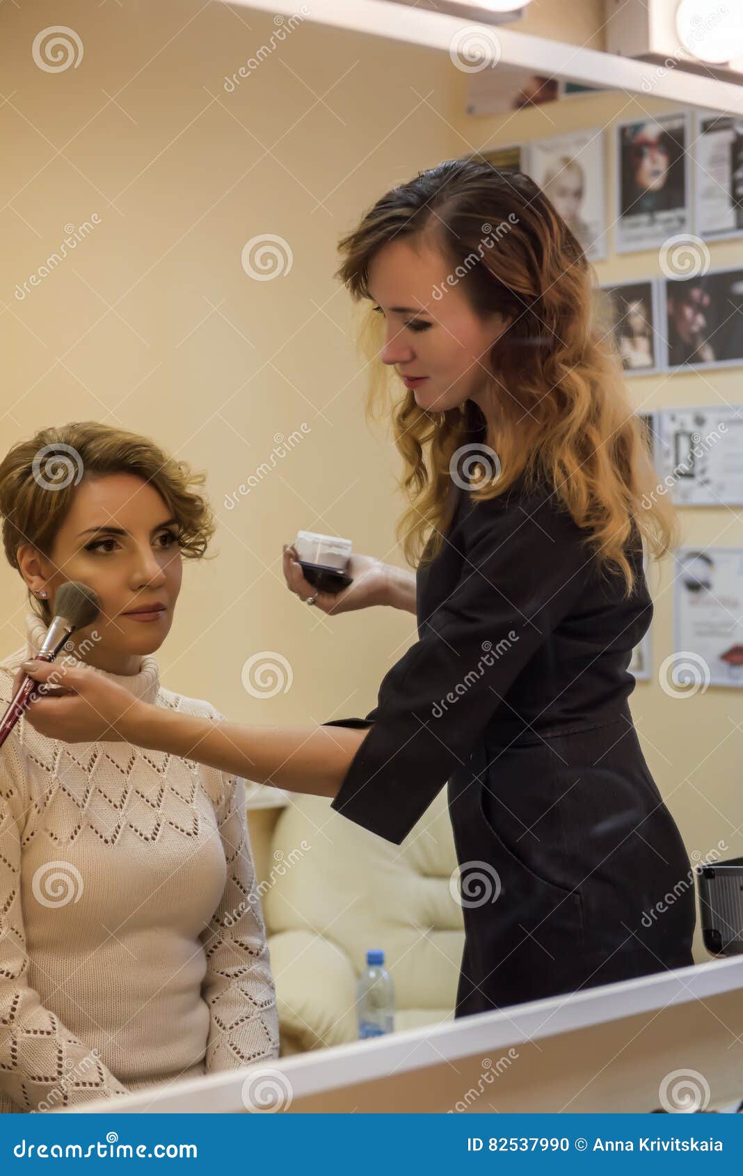 Stylist doing makeup model stock photo. Image of client - 82537990