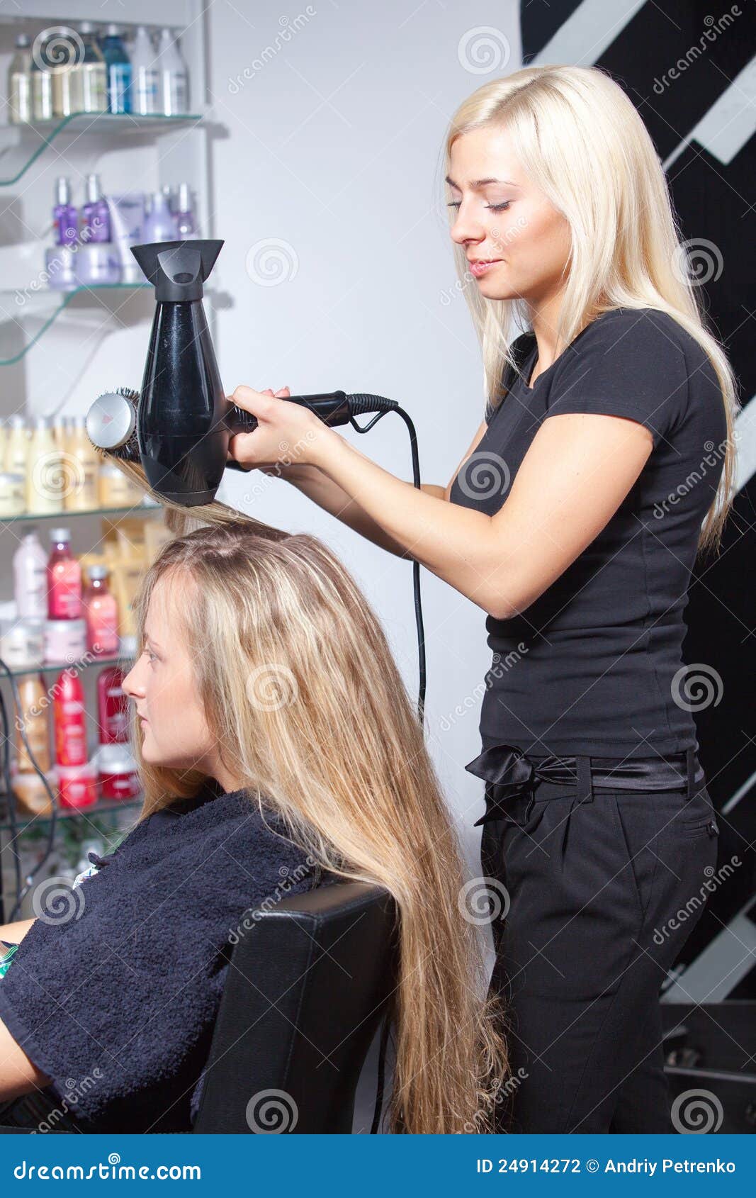 Stylist drying woman hair stock photo. Image of barber - 24914272