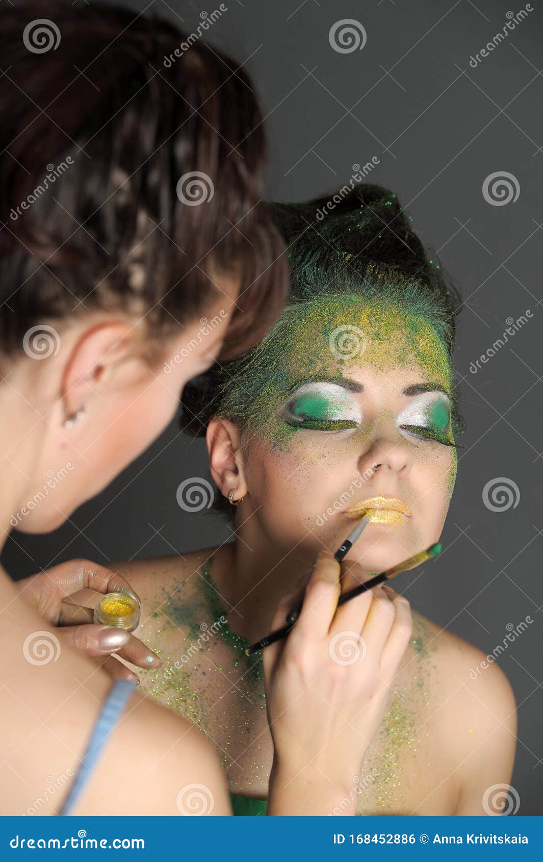 Stylist makes makeup model stock photo. Image of hair - 168452886