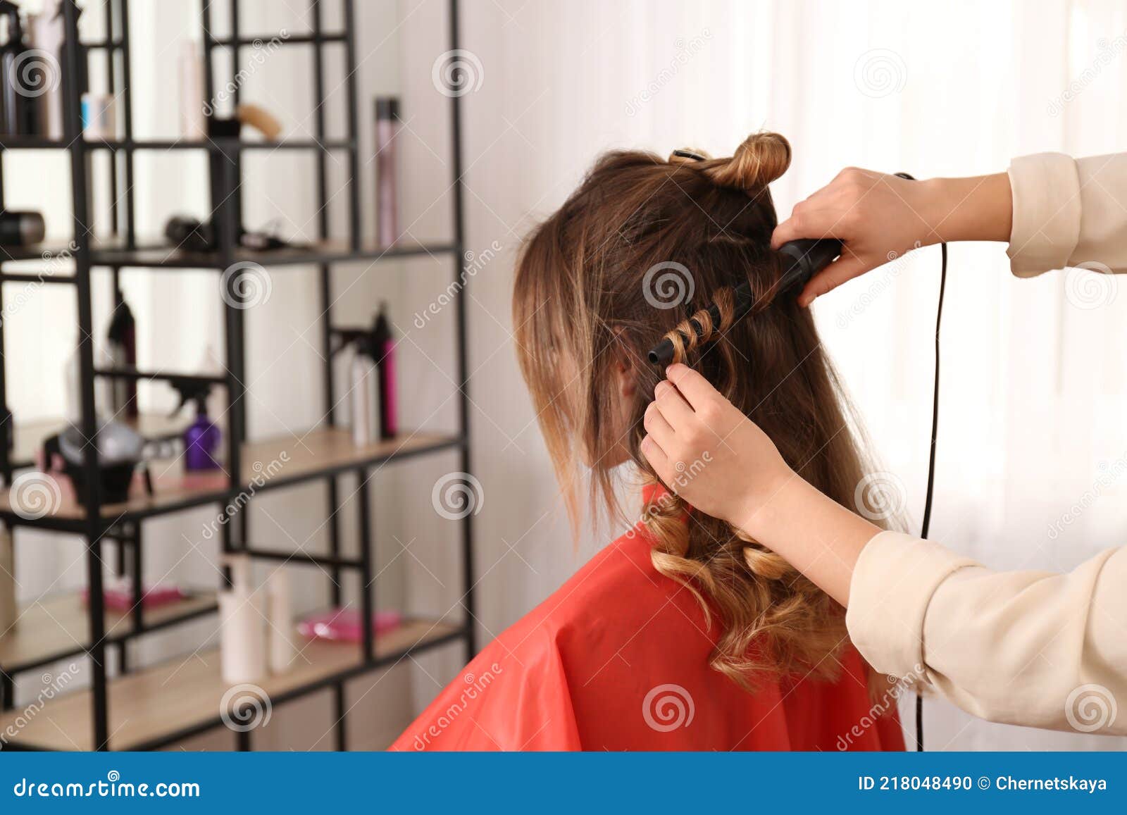 Stylist Working with Client in Salon, Making Hairstyle Stock Photo ...