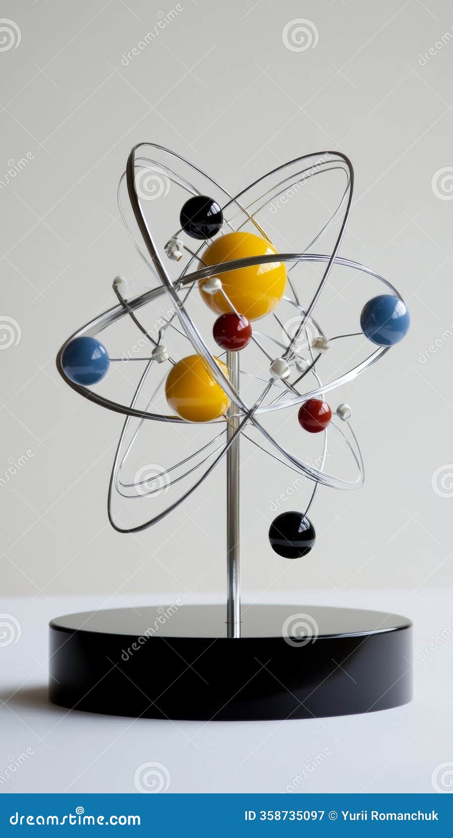 Stylized Atom Model with Spinning Electrons for Educational Themes in ...