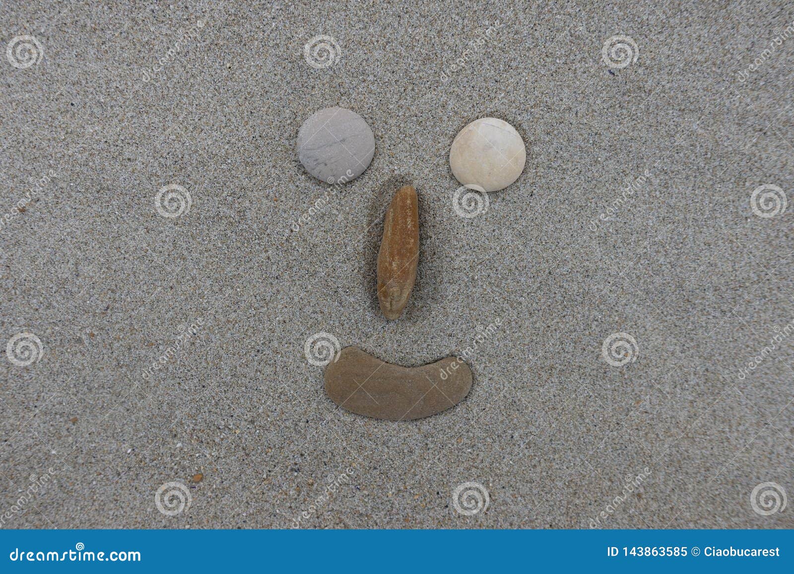 Stylized Face Composed with Pebbles on the Beach Stock Image - Image of ...