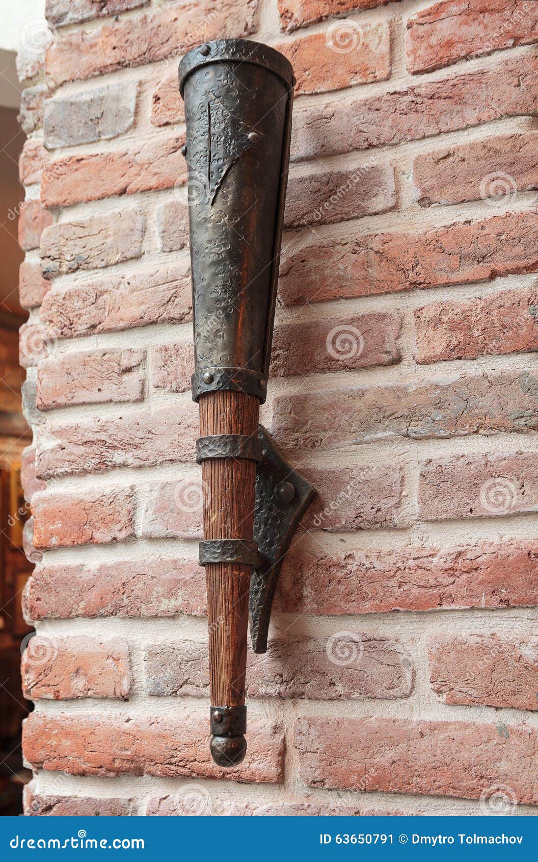 Stylized Lamp in the Form of the Ancient Torch on a Brick Wall Stock ...