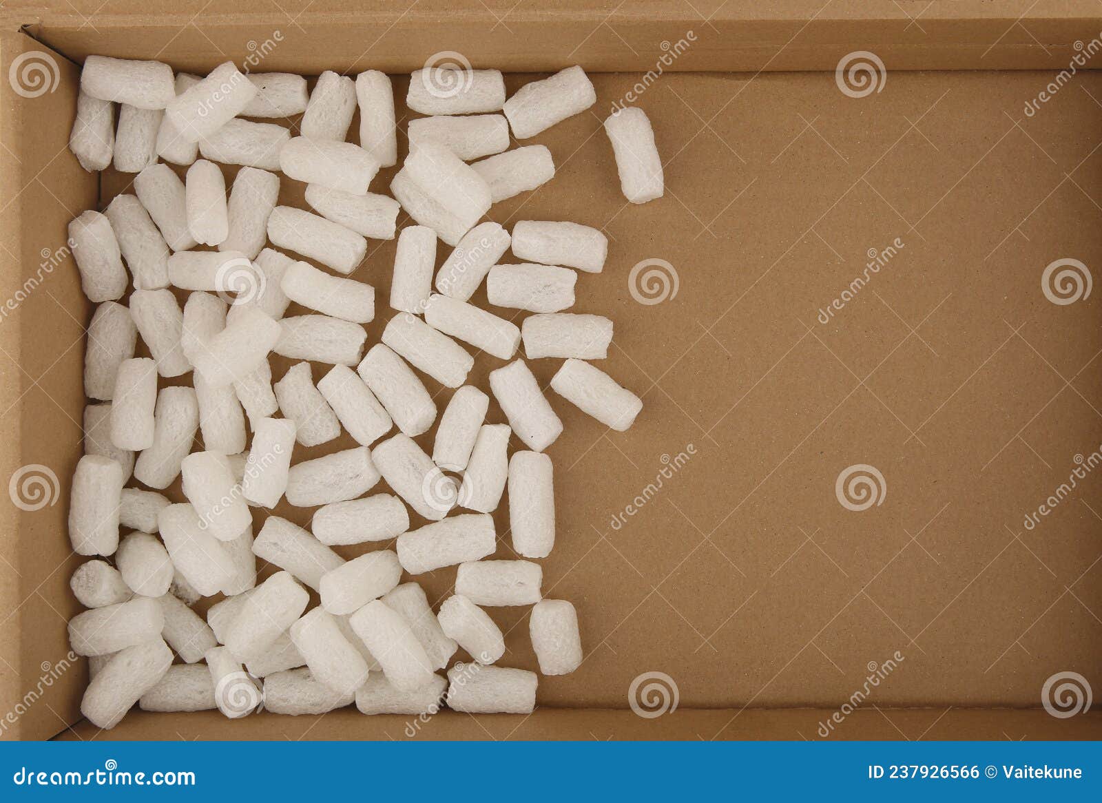 Styrofoam Packing Peanuts in Cardboard Box Background. Stock Photo ...