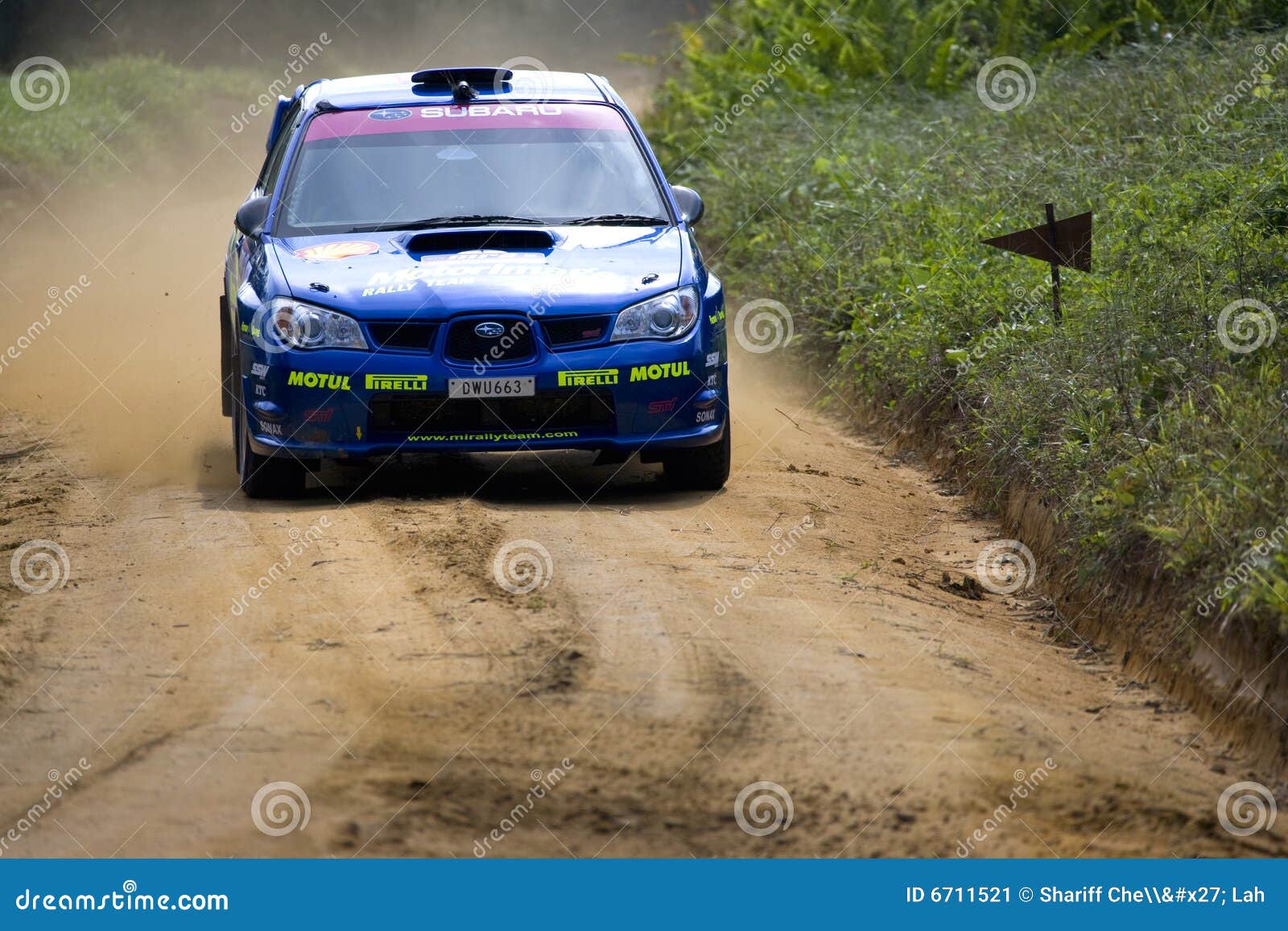 Subaru rally car on track editorial photo. Image of green - 6711521