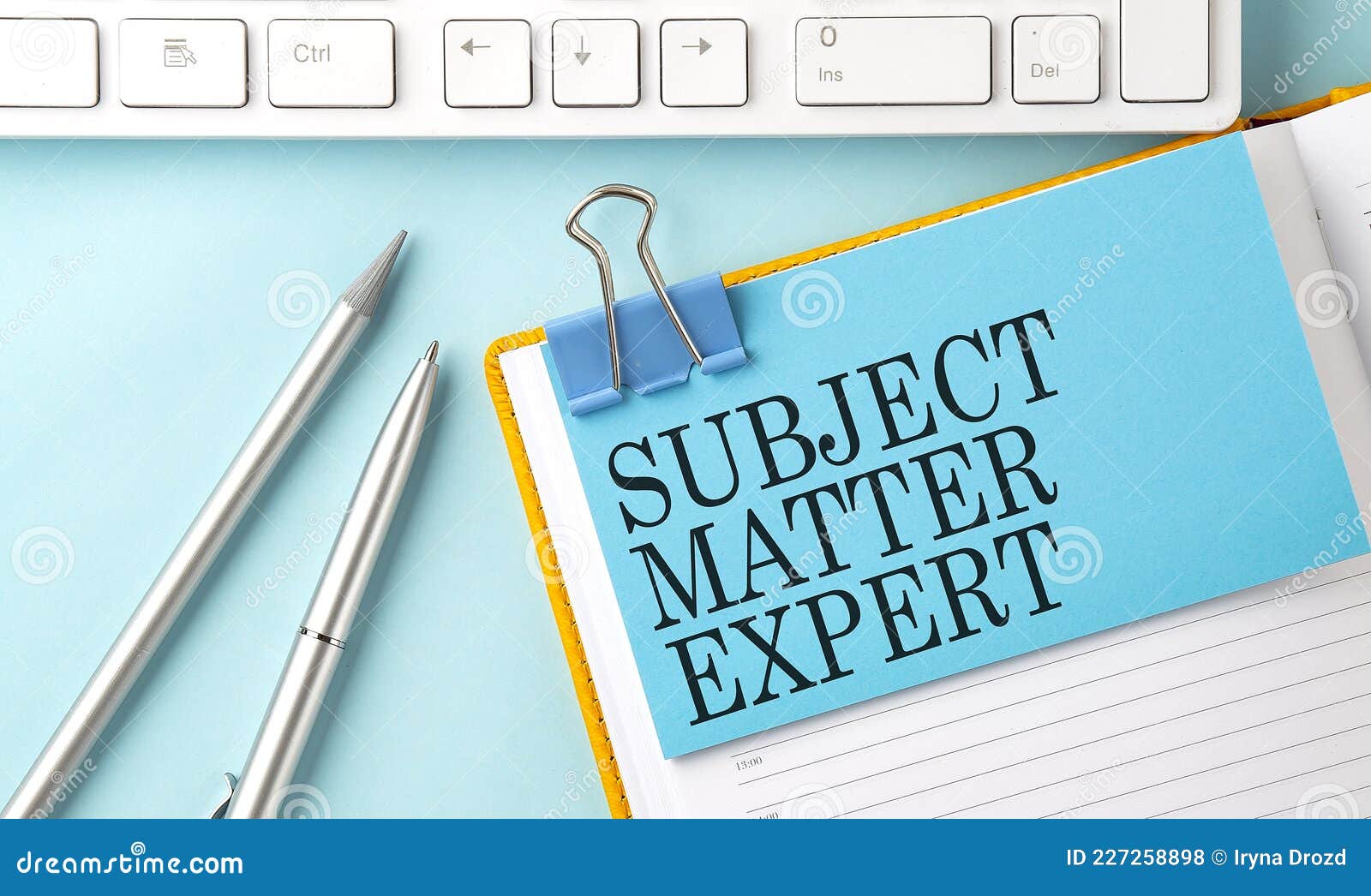 SUBJECT MATTER EXPERT Text on Sticker on the Blue Background with Pen ...