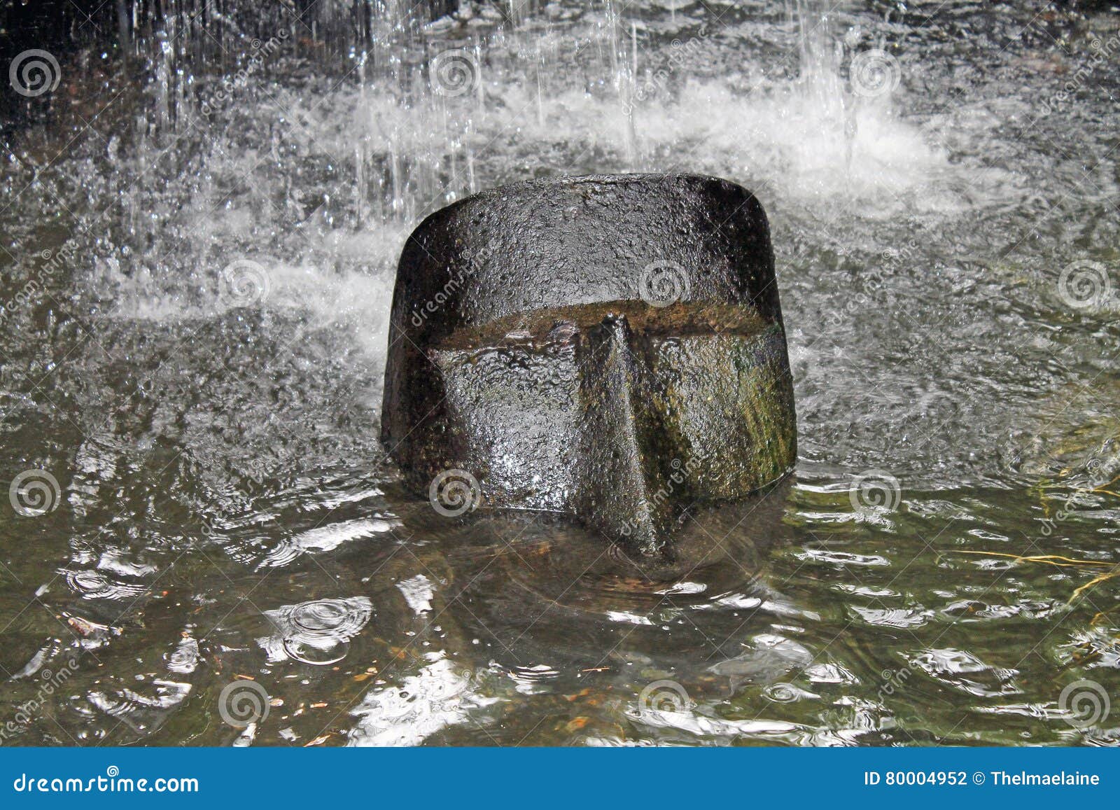 Submerged Maori with a Waterfall in the Background Editorial ...