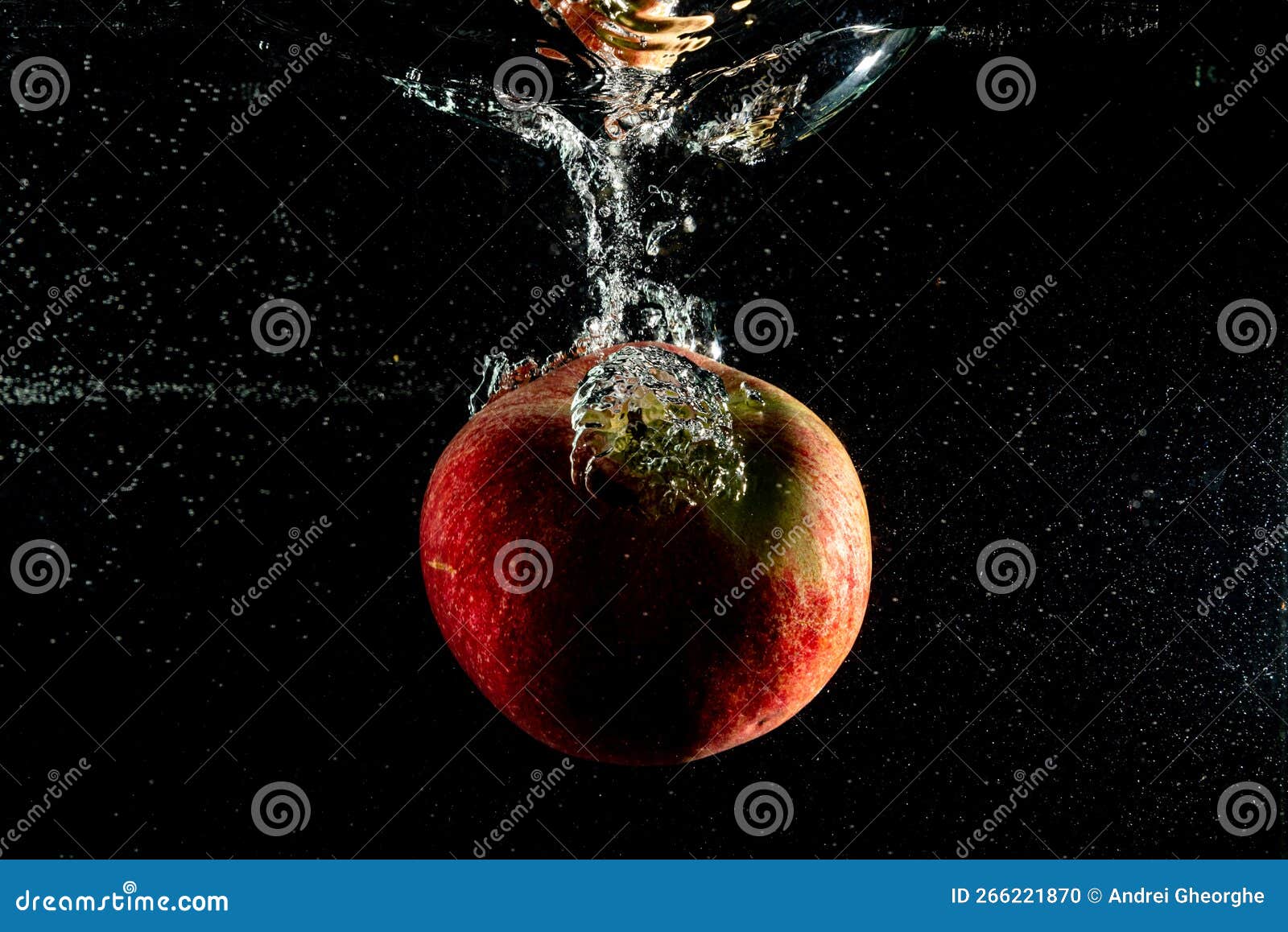Submerged red apple stock photo. Image of circle, planet - 266221870