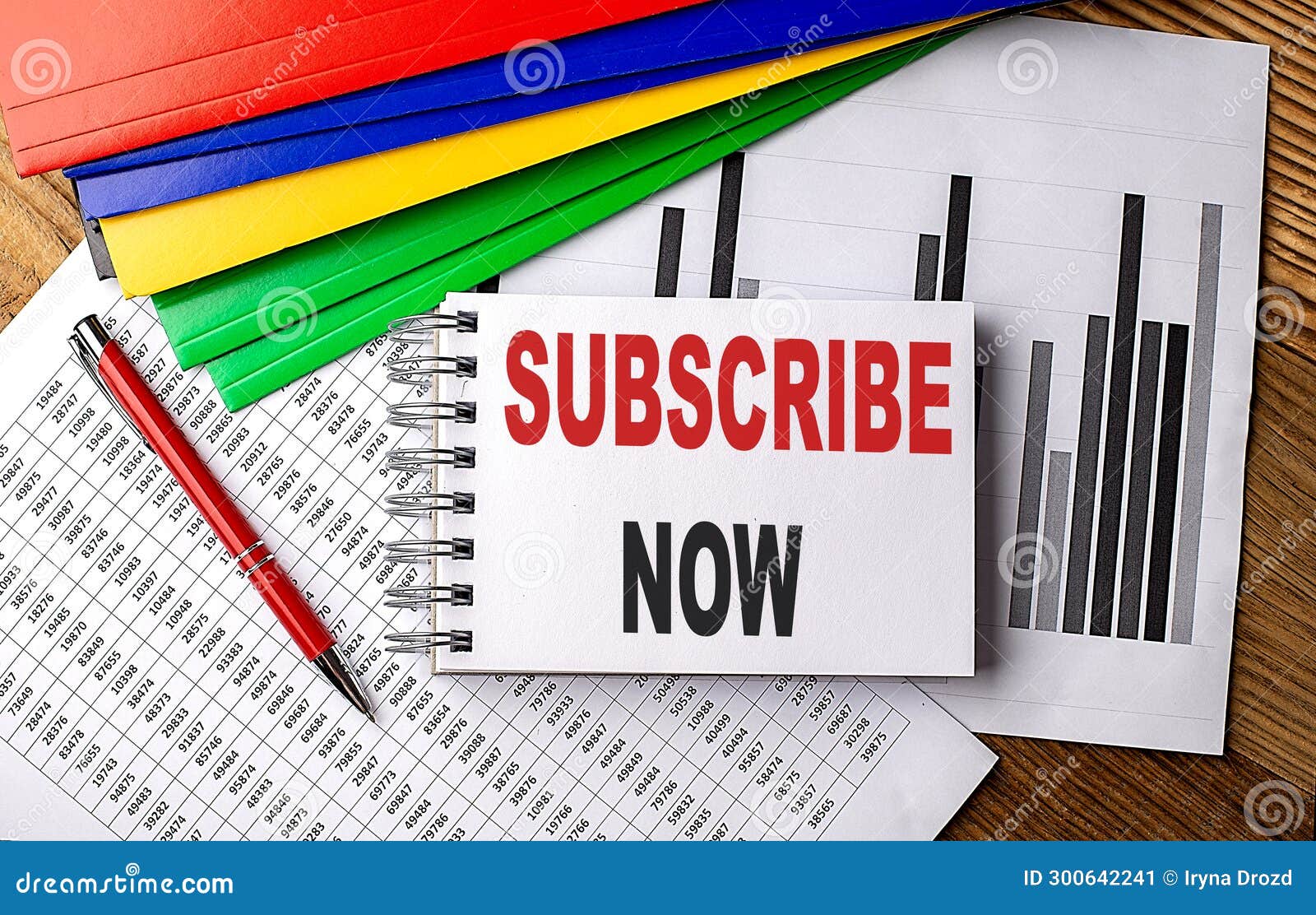SUBSCRIBE NOW Text on a Notebook with Pen, Folder on a Chart Background ...
