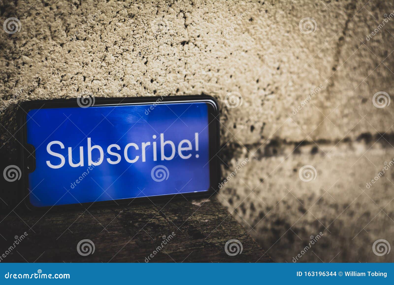 Subscribe Text in Smartphone Blue Screen Stock Photo - Image of online ...