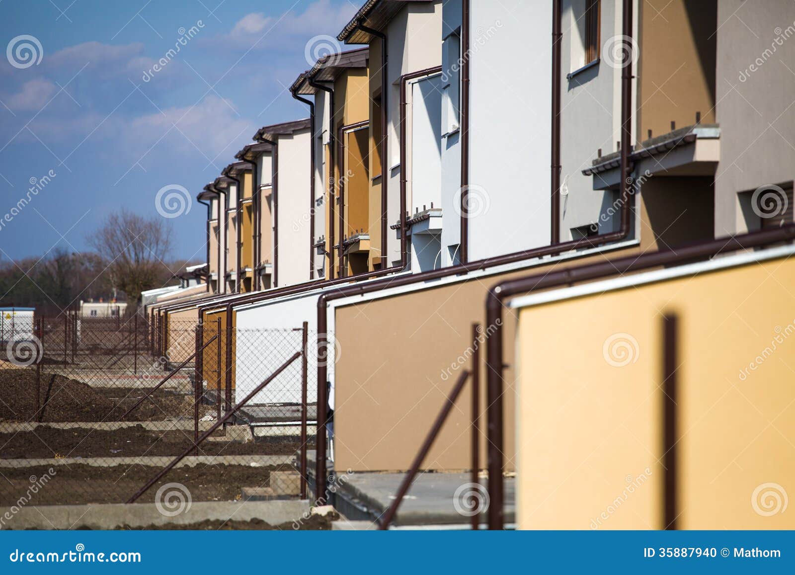 Suburb houses in a row stock photo. Image of estate, affordable - 35887940