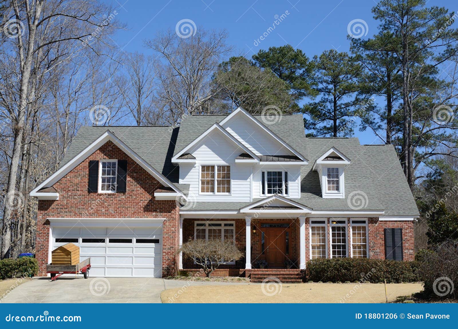 Suburban Home stock photo. Image of residential, brick - 18801206