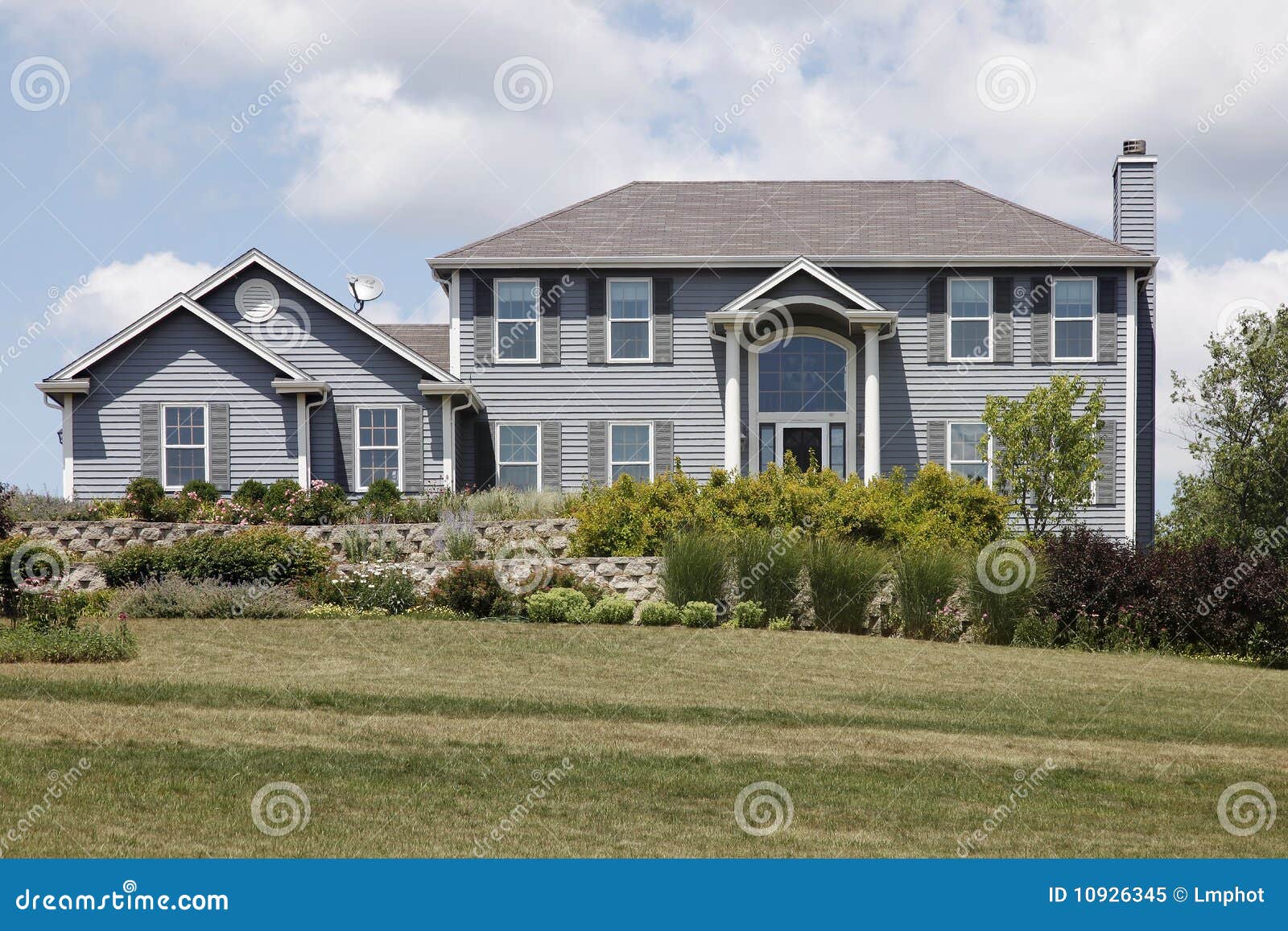 Suburban Home with Arch and Columns Stock Image - Image of expensive ... Suburban Home with Arch and Columns Stock Image - Image of expensive ...