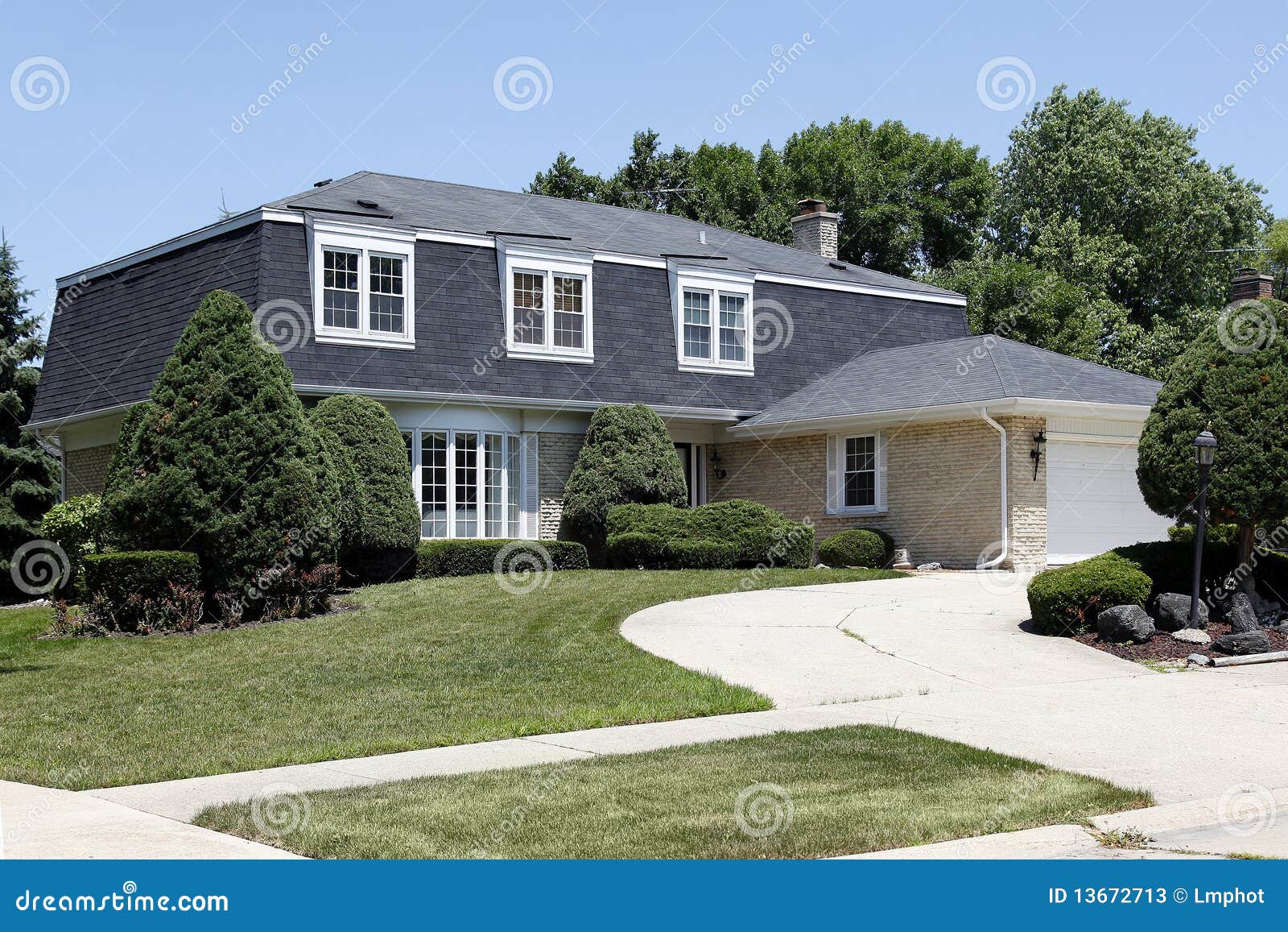 Suburban Home with Circular Drive Stock Image - Image of living, large ...