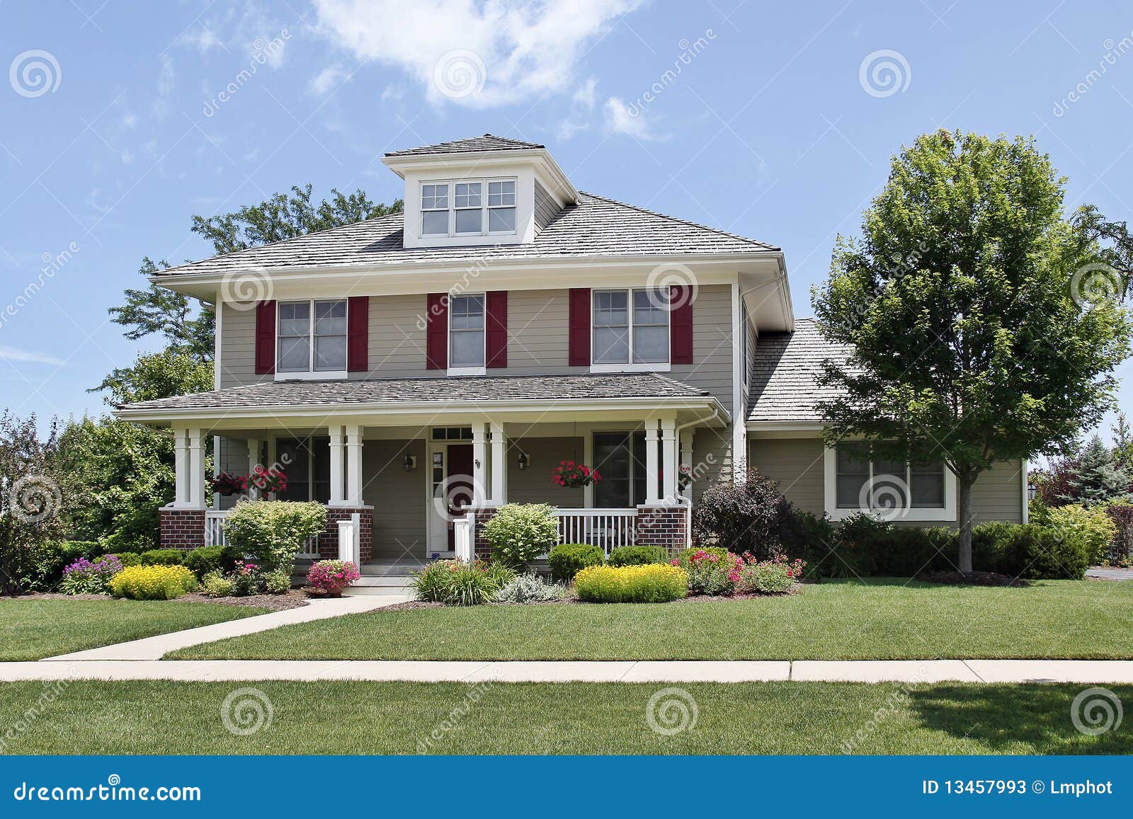 Suburban Home with Red Shutters Stock Image - Image of house, grass ...